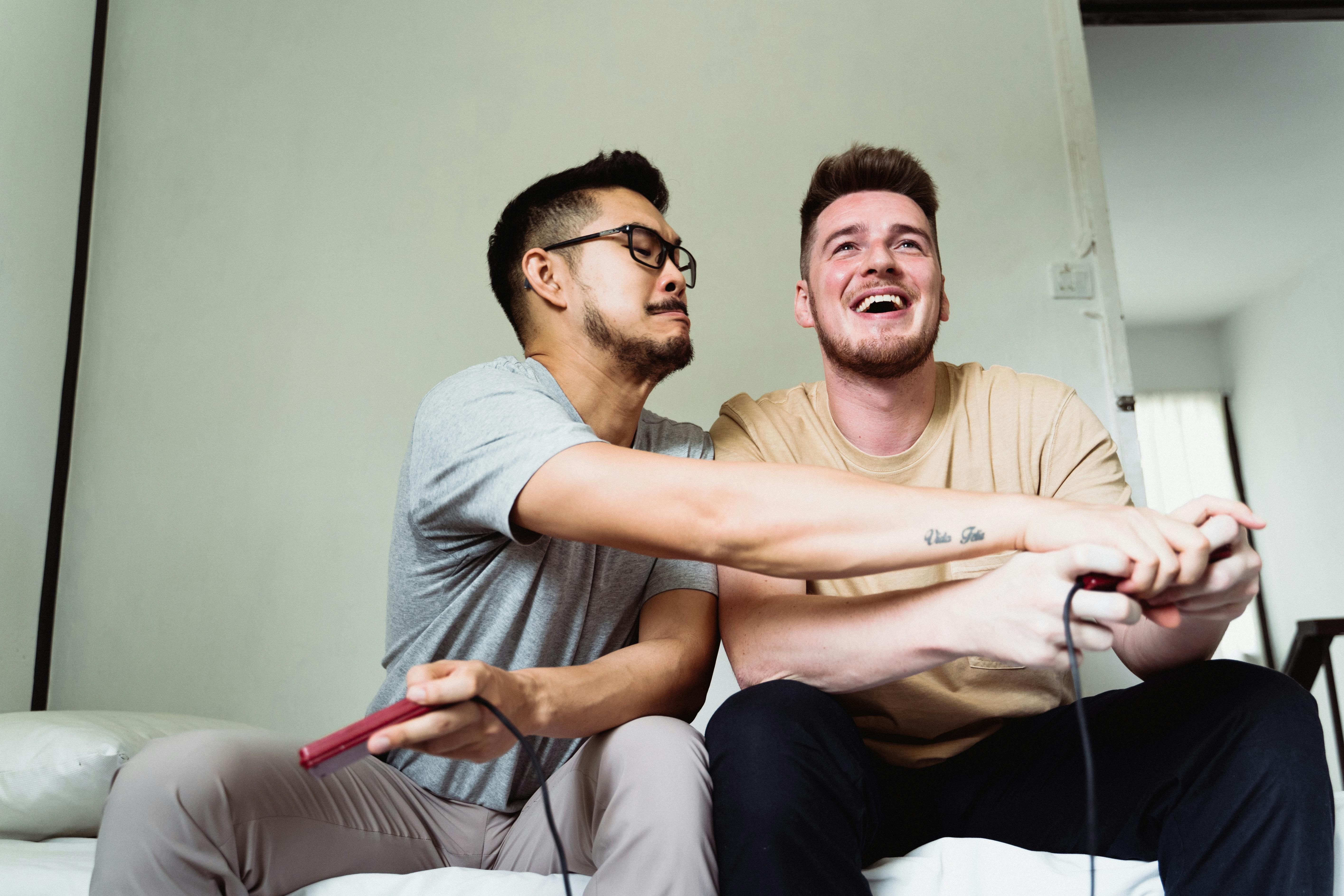 Men Playing Video Game Together · Free Stock Photo