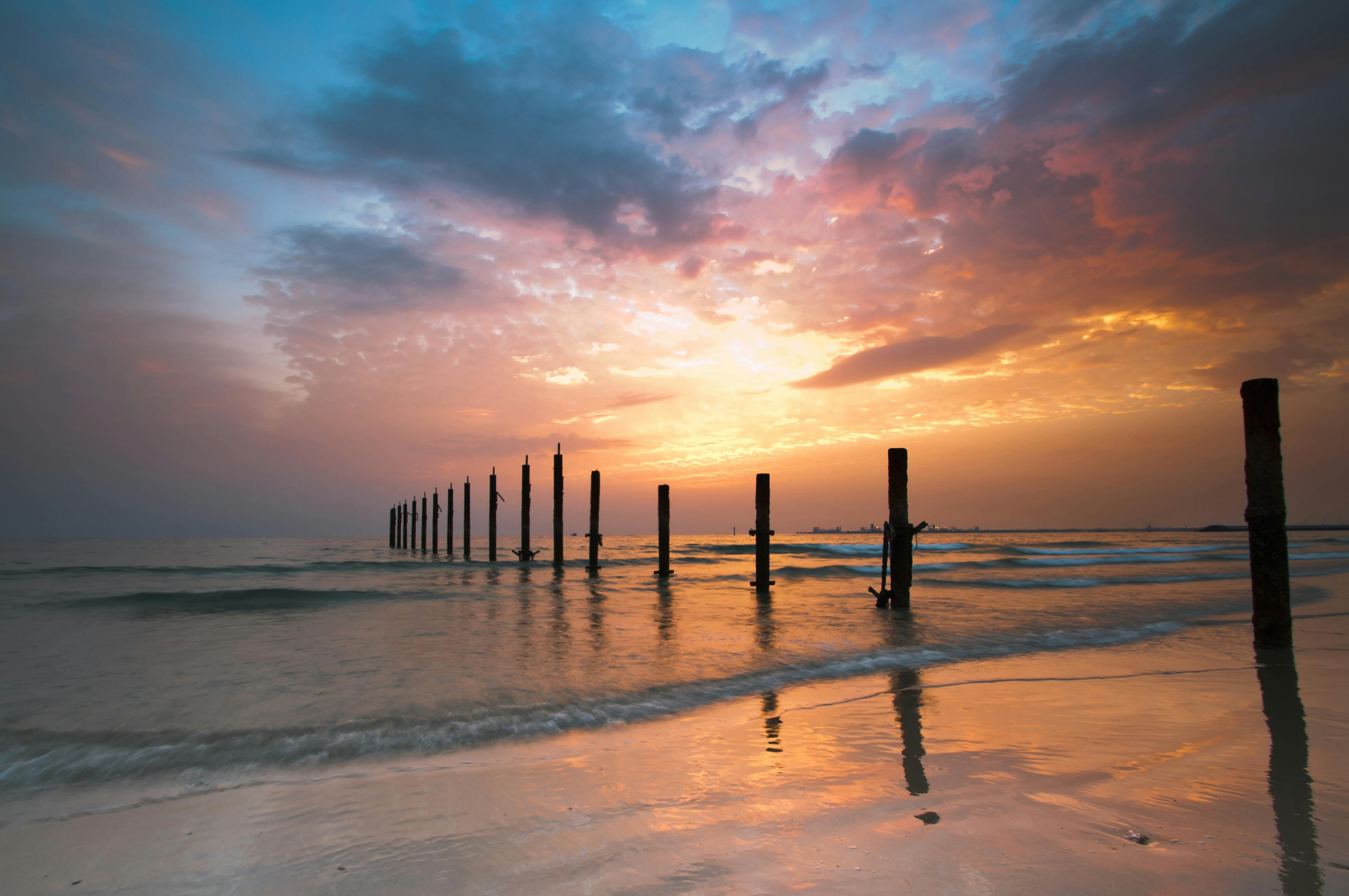 Pier over Water at Sunset · Free Stock Photo
