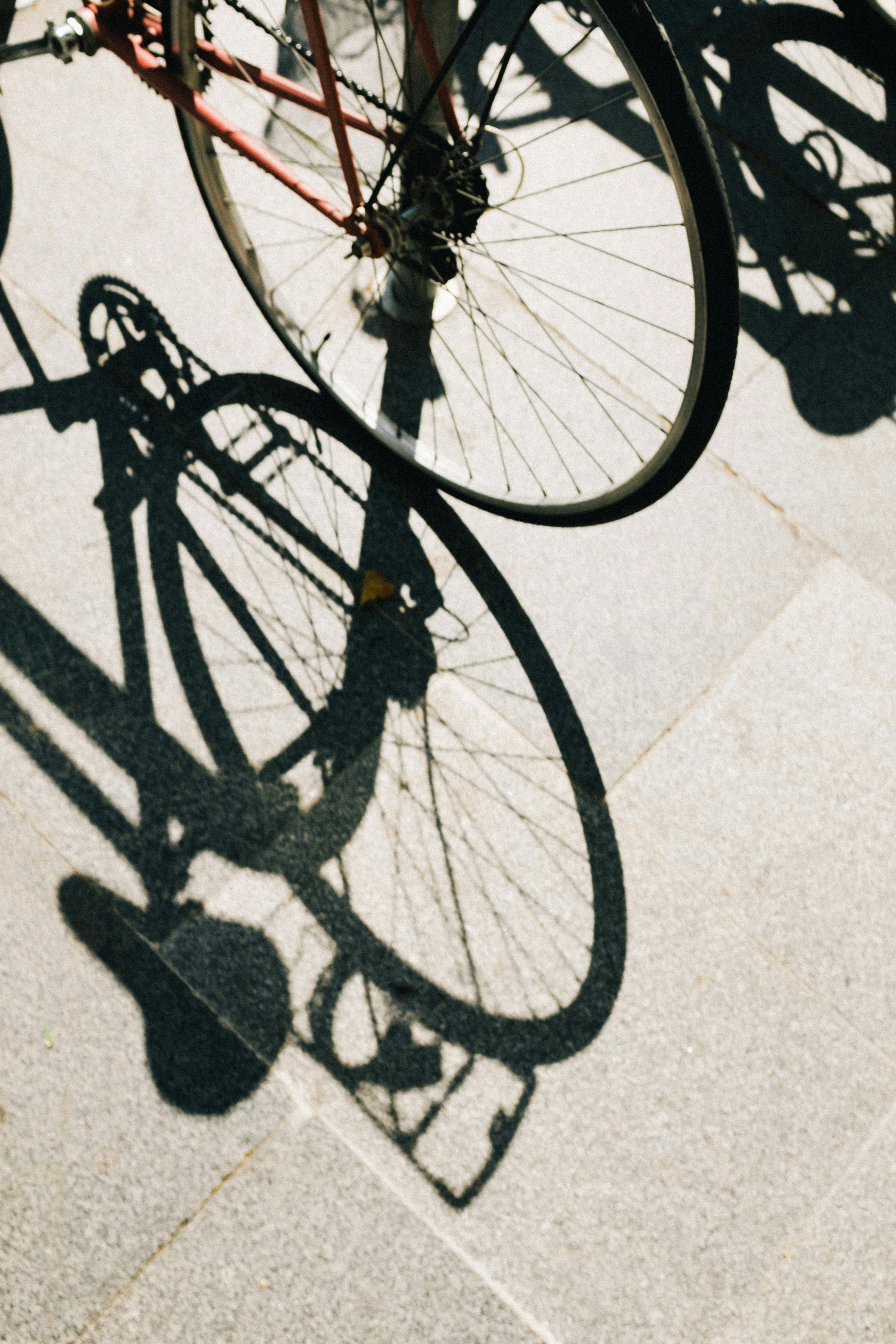 Shadow of Bicycle on Concrete · Free Stock Photo
