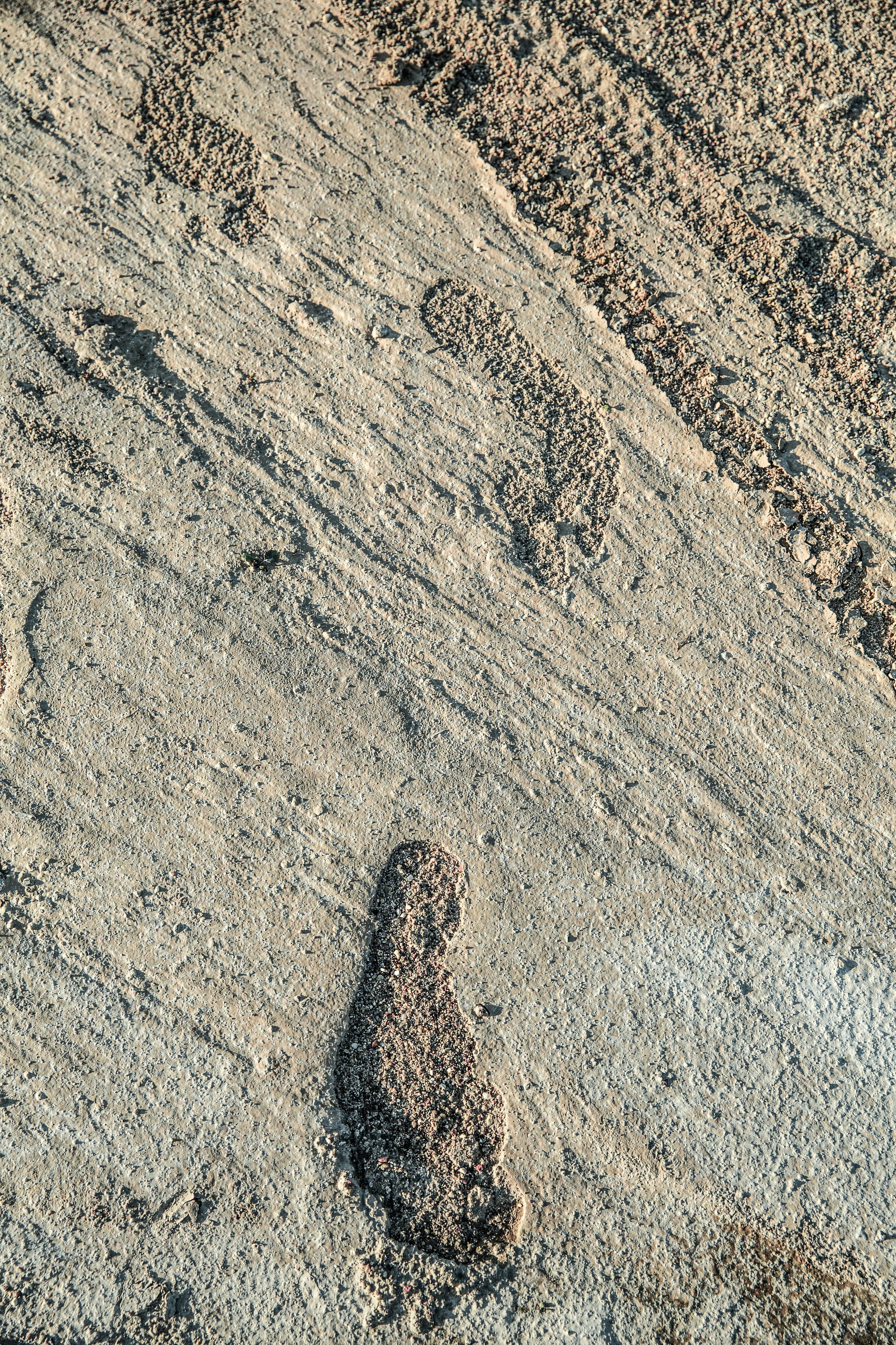 Footsteps on Concrete Floor · Free Stock Photo