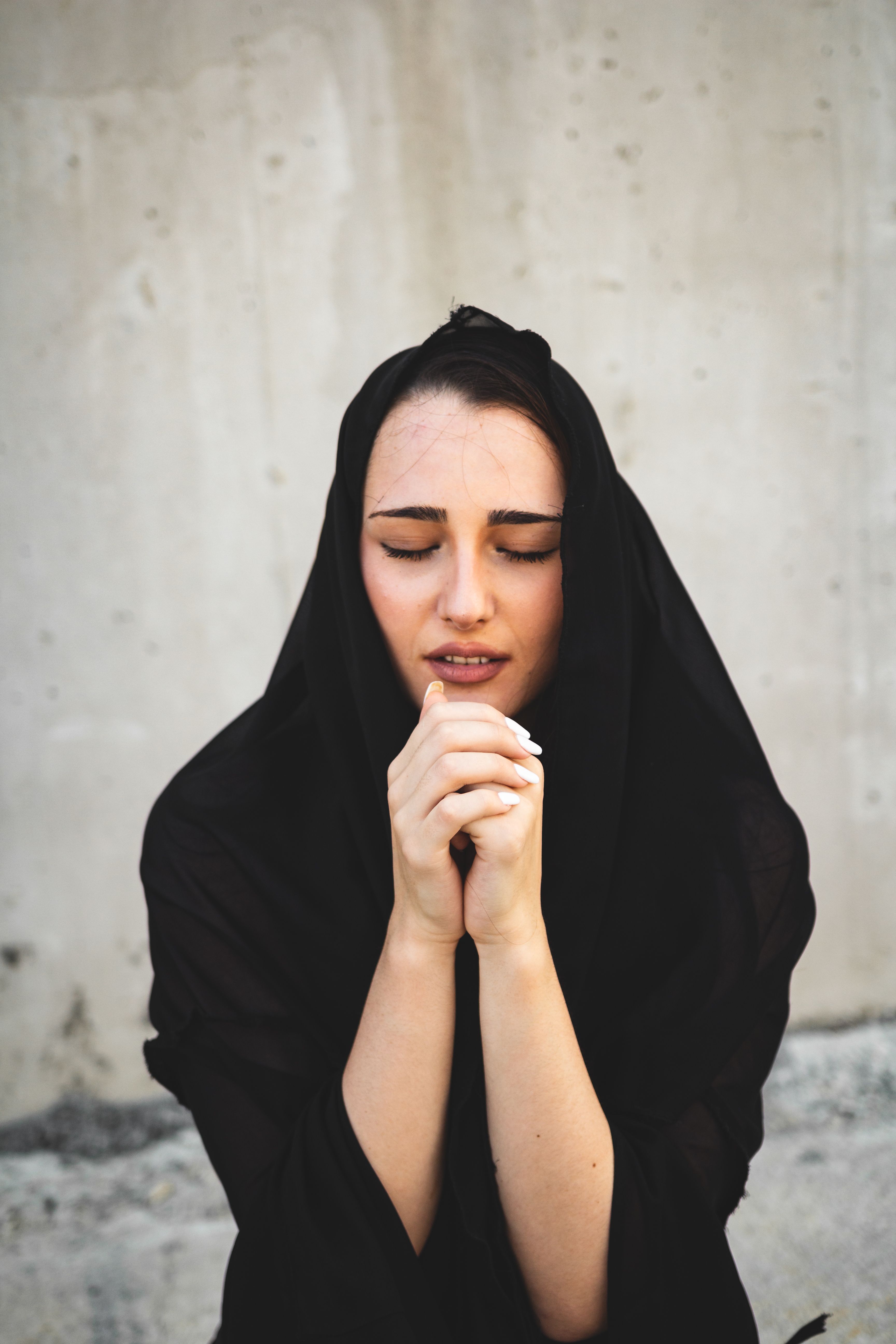 A Woman Praying in the Church · Free Stock Photo