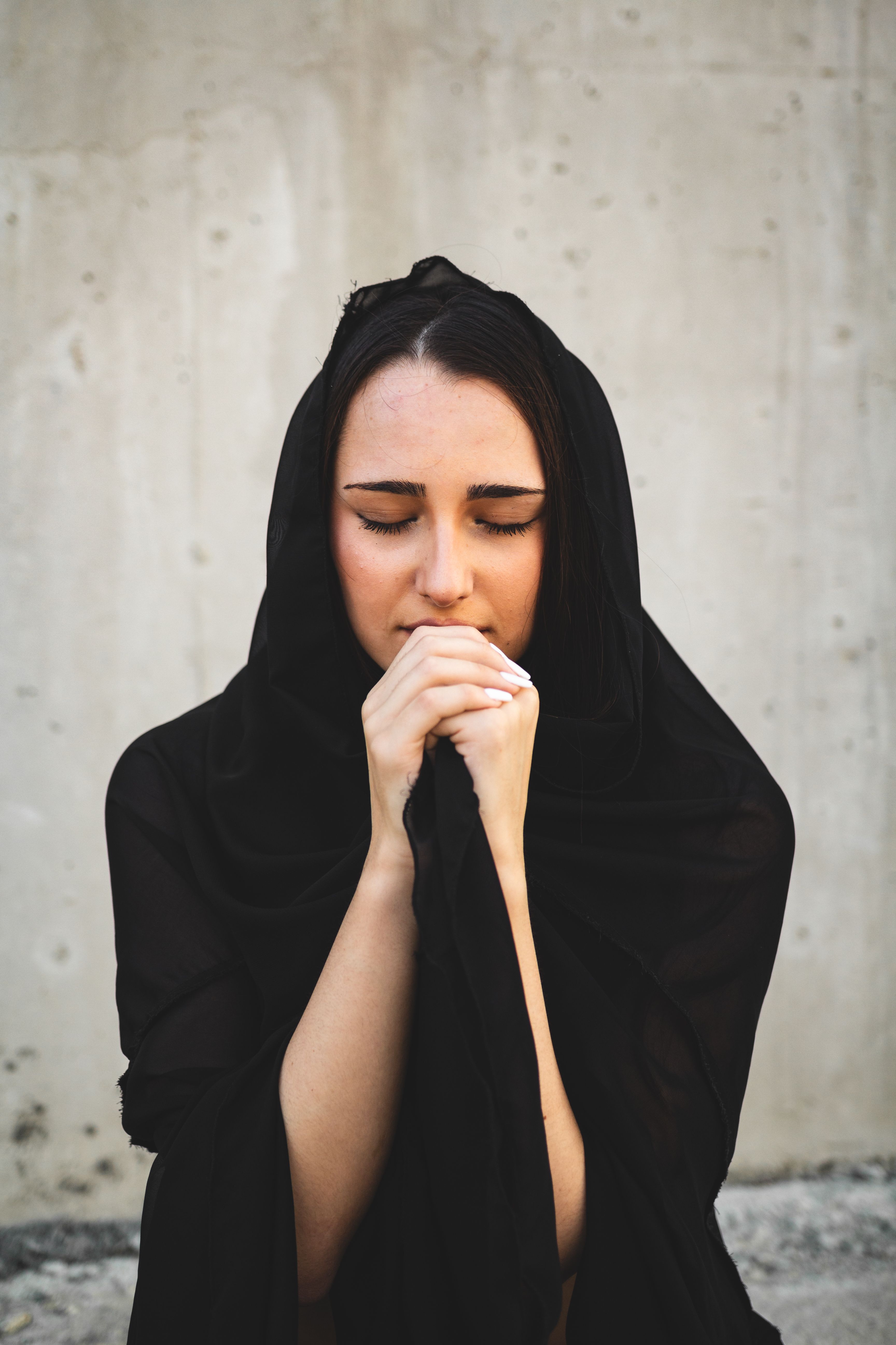 A Woman in a Red Top Praying · Free Stock Photo