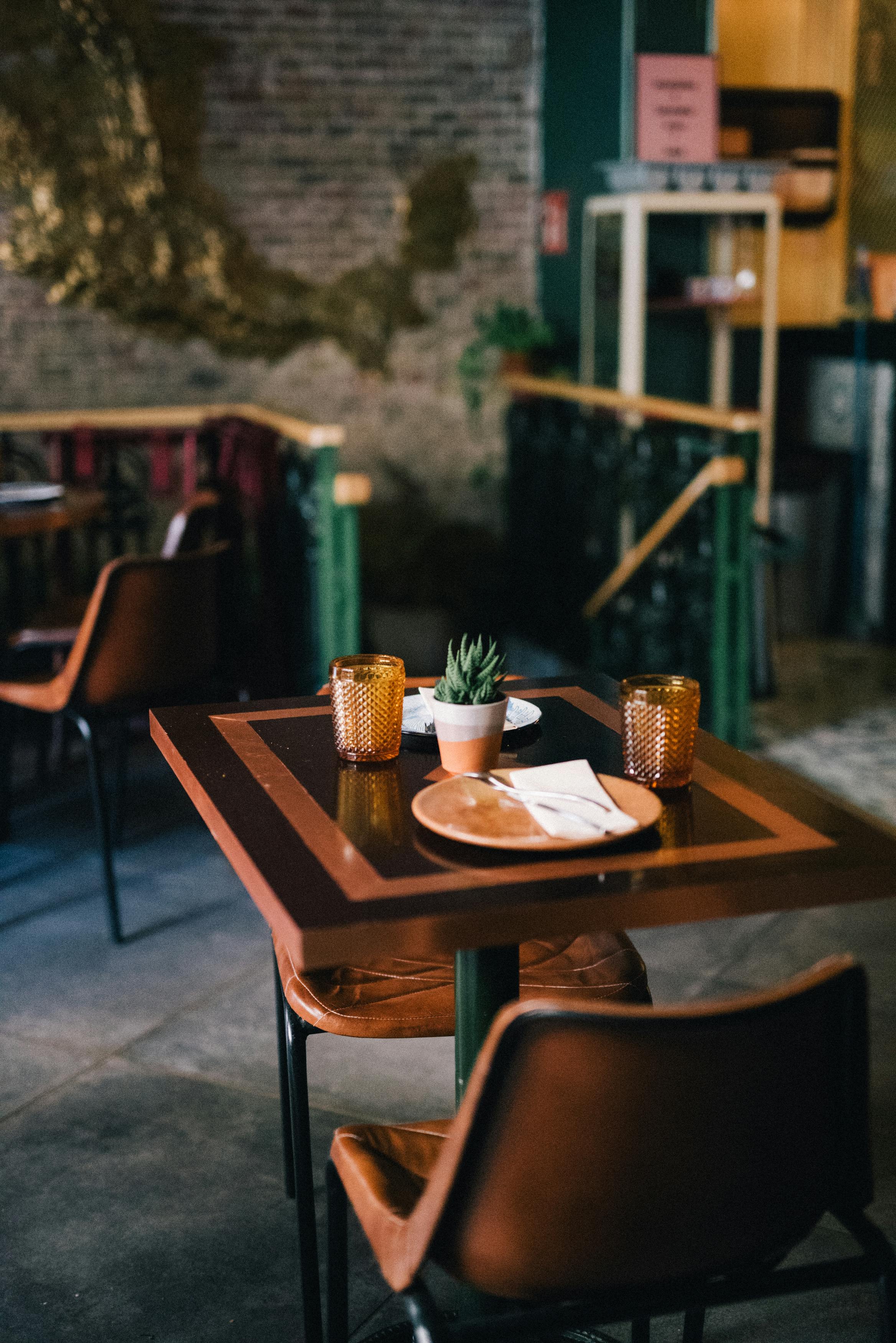 Restaurant Interior with White Walls and Wooden Chairs and Tables ...