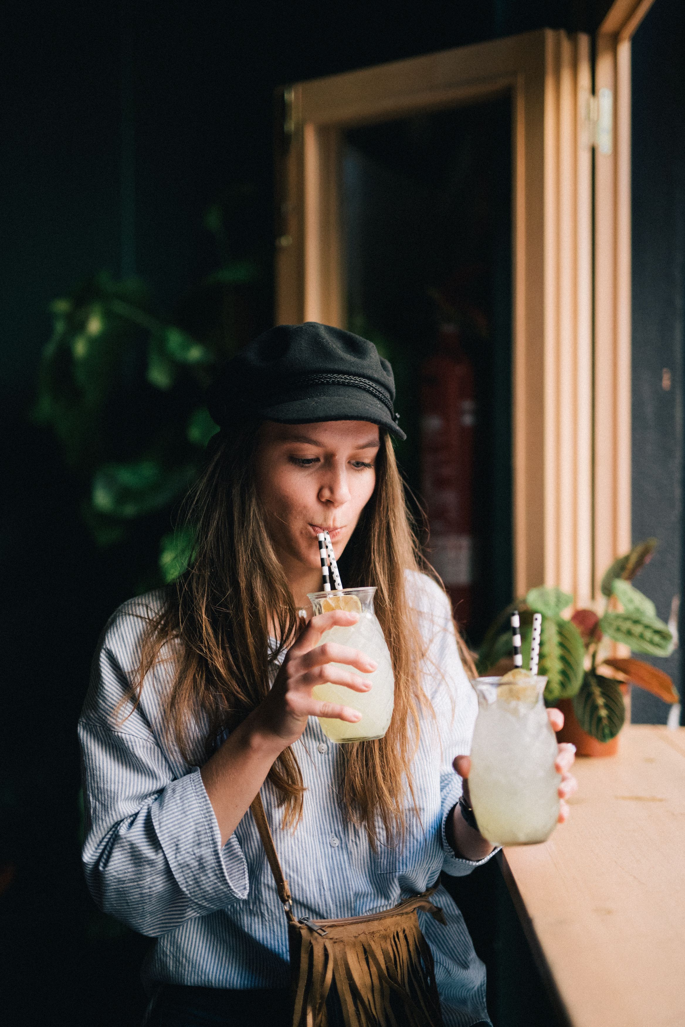 Woman Sipping from Cup · Free Stock Photo