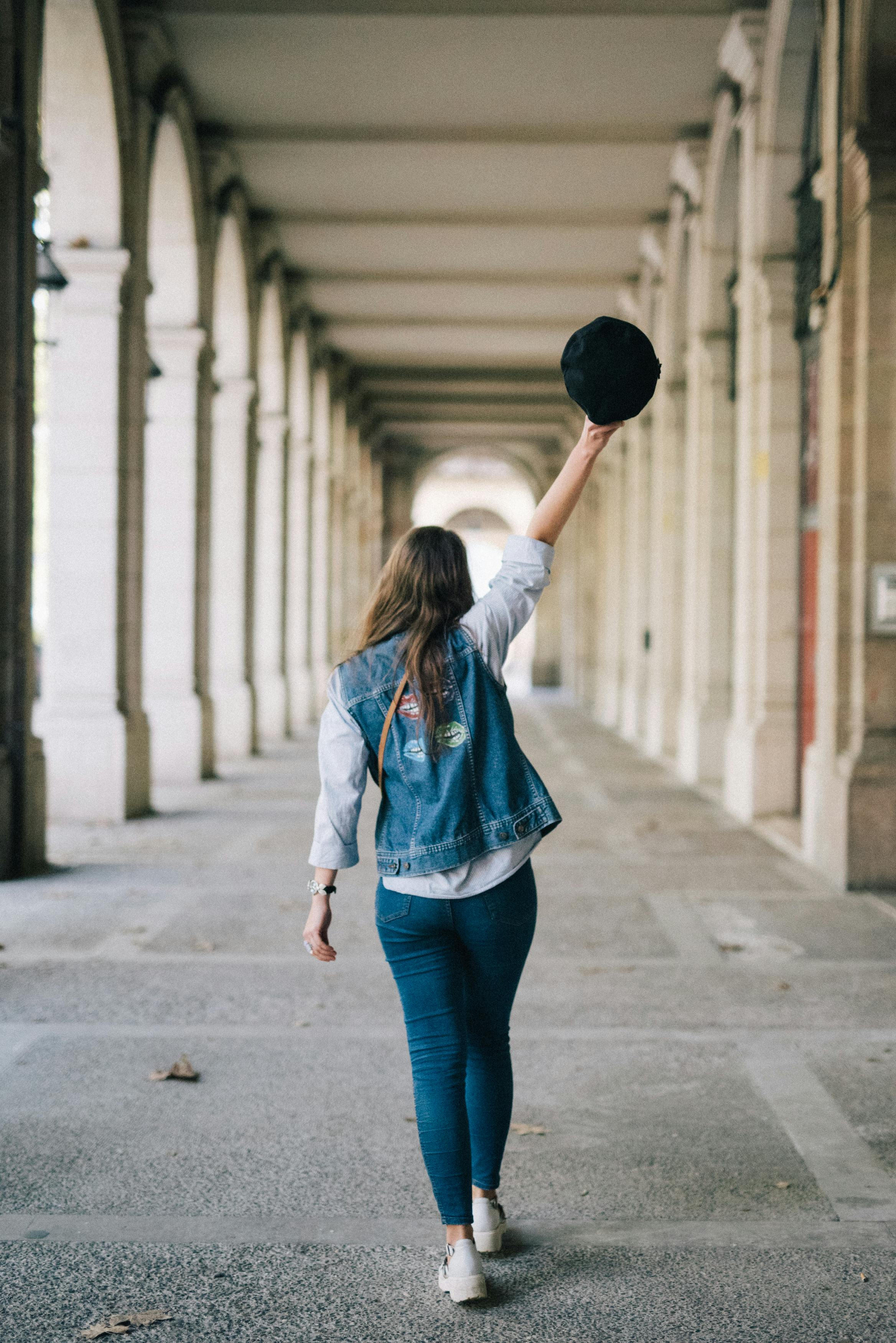 Woman with Arms Raised Towards Sky · Free Stock Photo