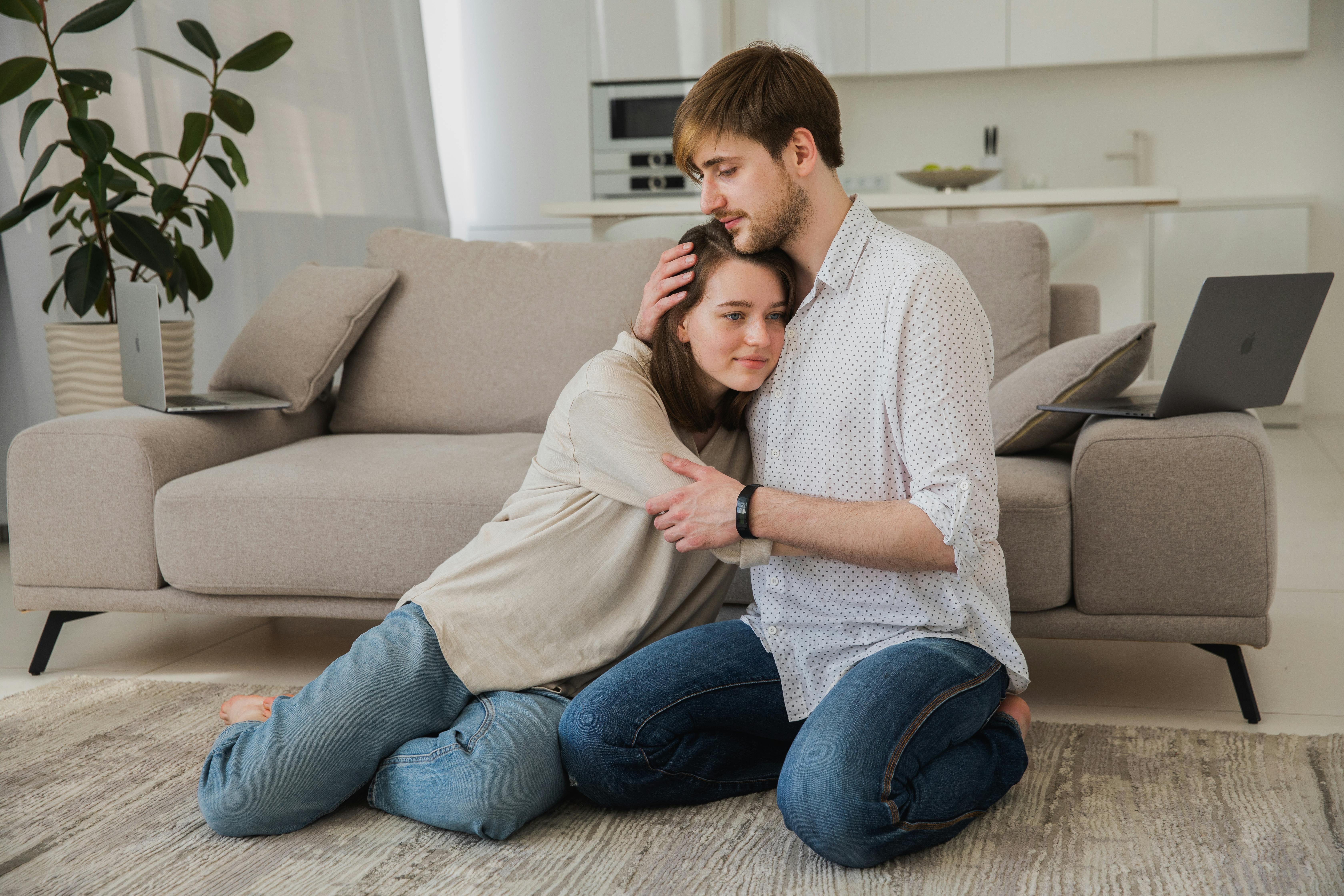 Couple Hugging in Living Room · Free Stock Photo