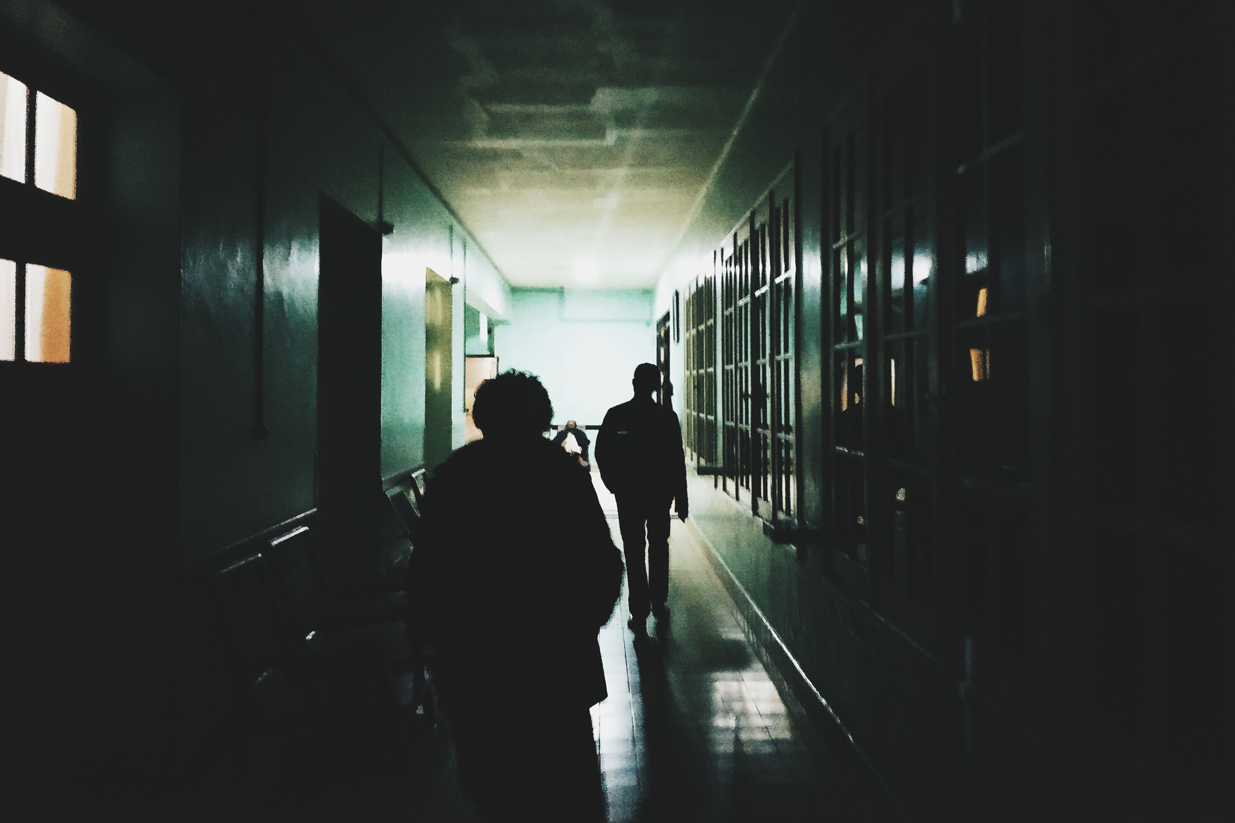 People in a Hallway of a Building · Free Stock Photo