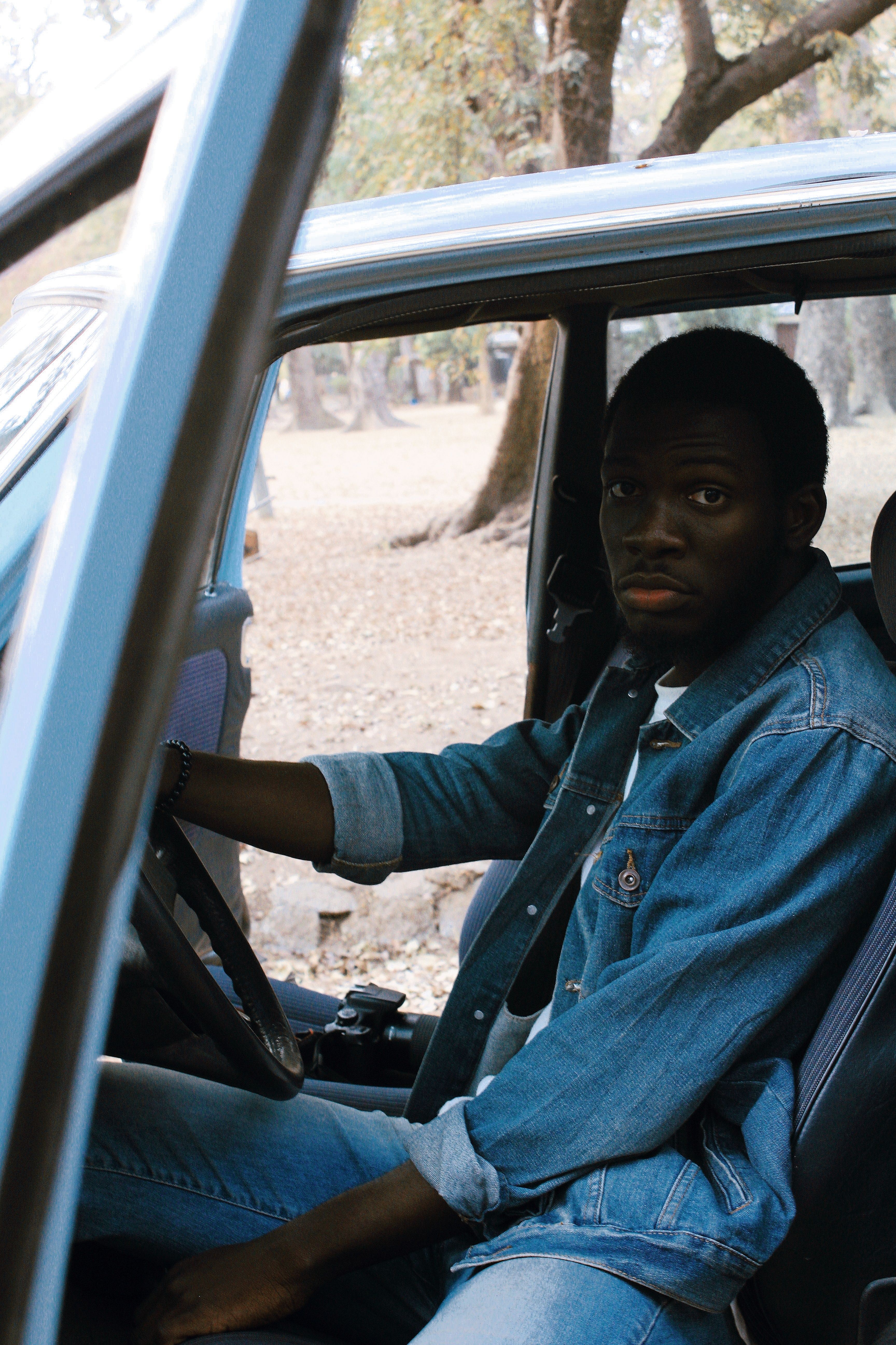 African Man Driving a Car · Free Stock Photo