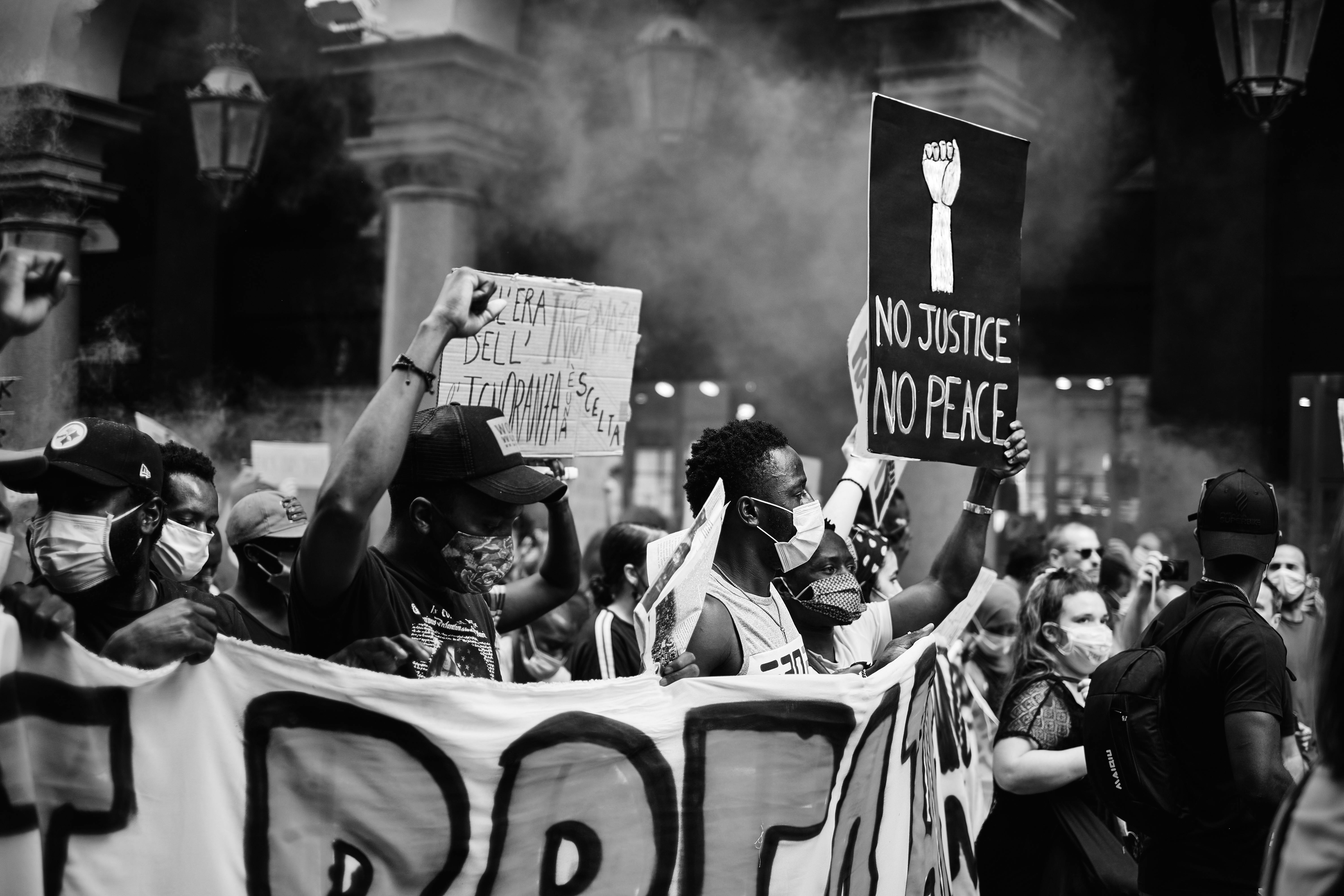 Grayscale Photo of People Protesting on the Street with Placards · Free ...