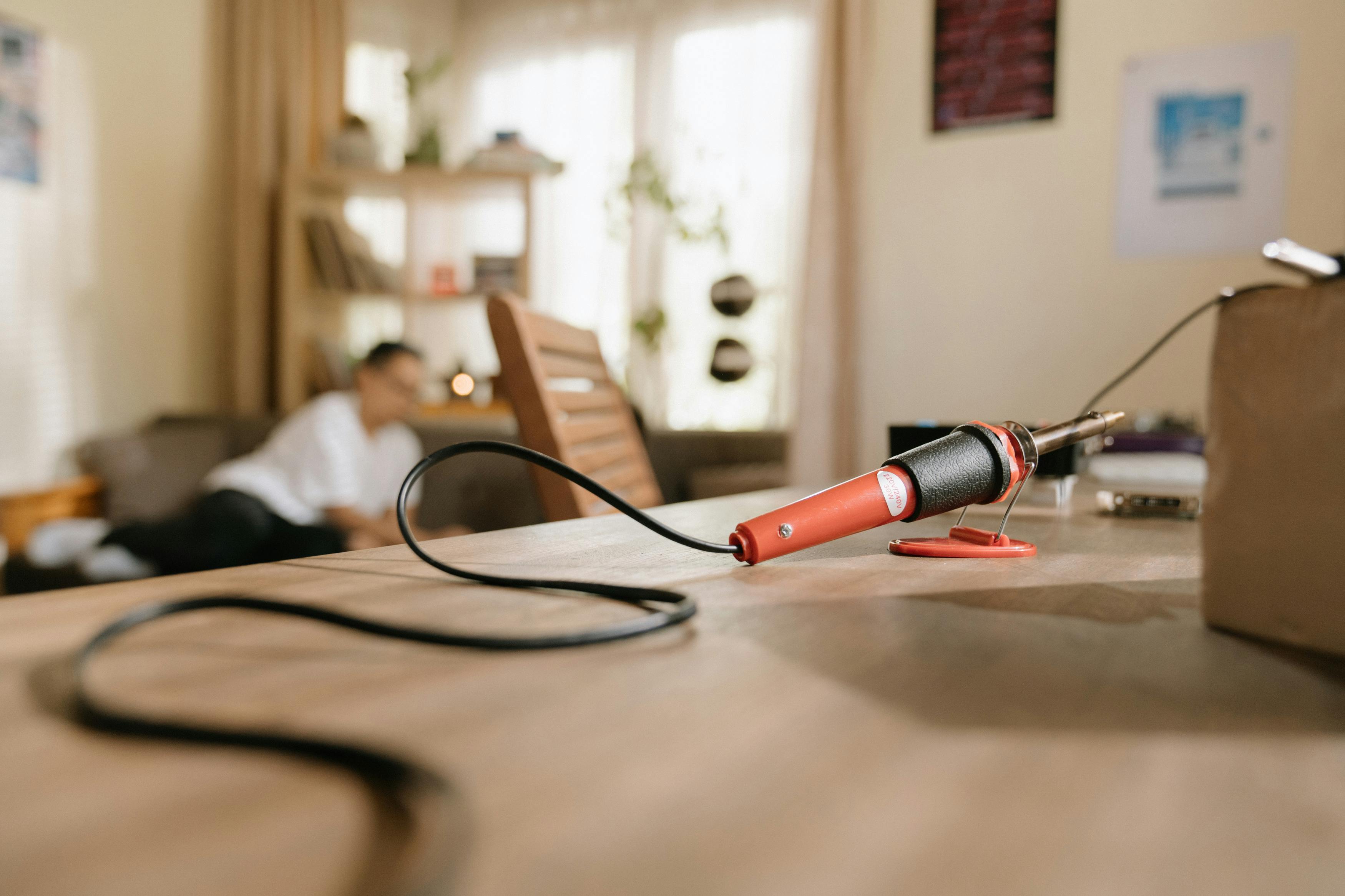 Red and Black Microphone on Brown Wooden Table · Free Stock Photo