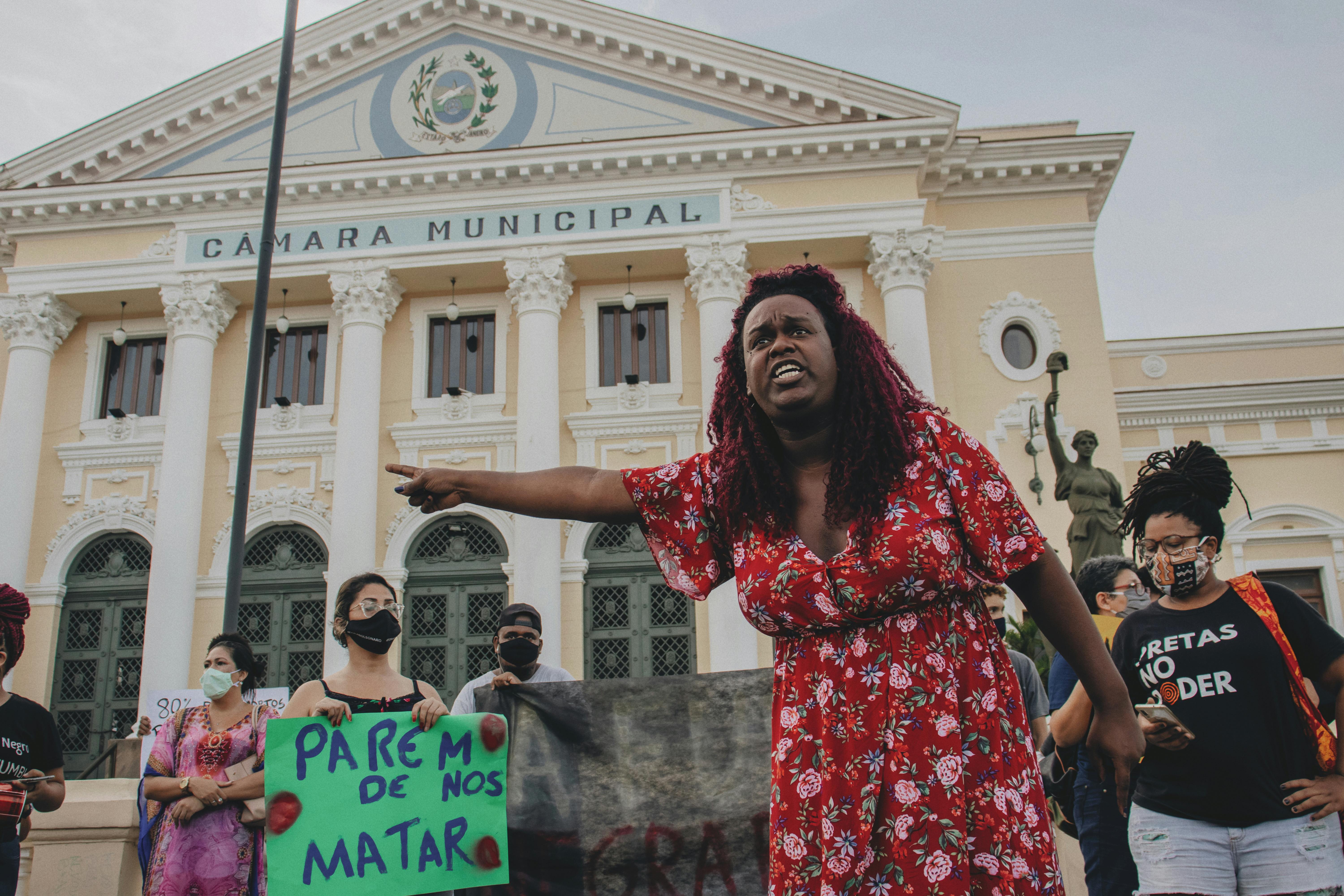 People Protesting In Front of a Municipal Building · Free Stock Photo