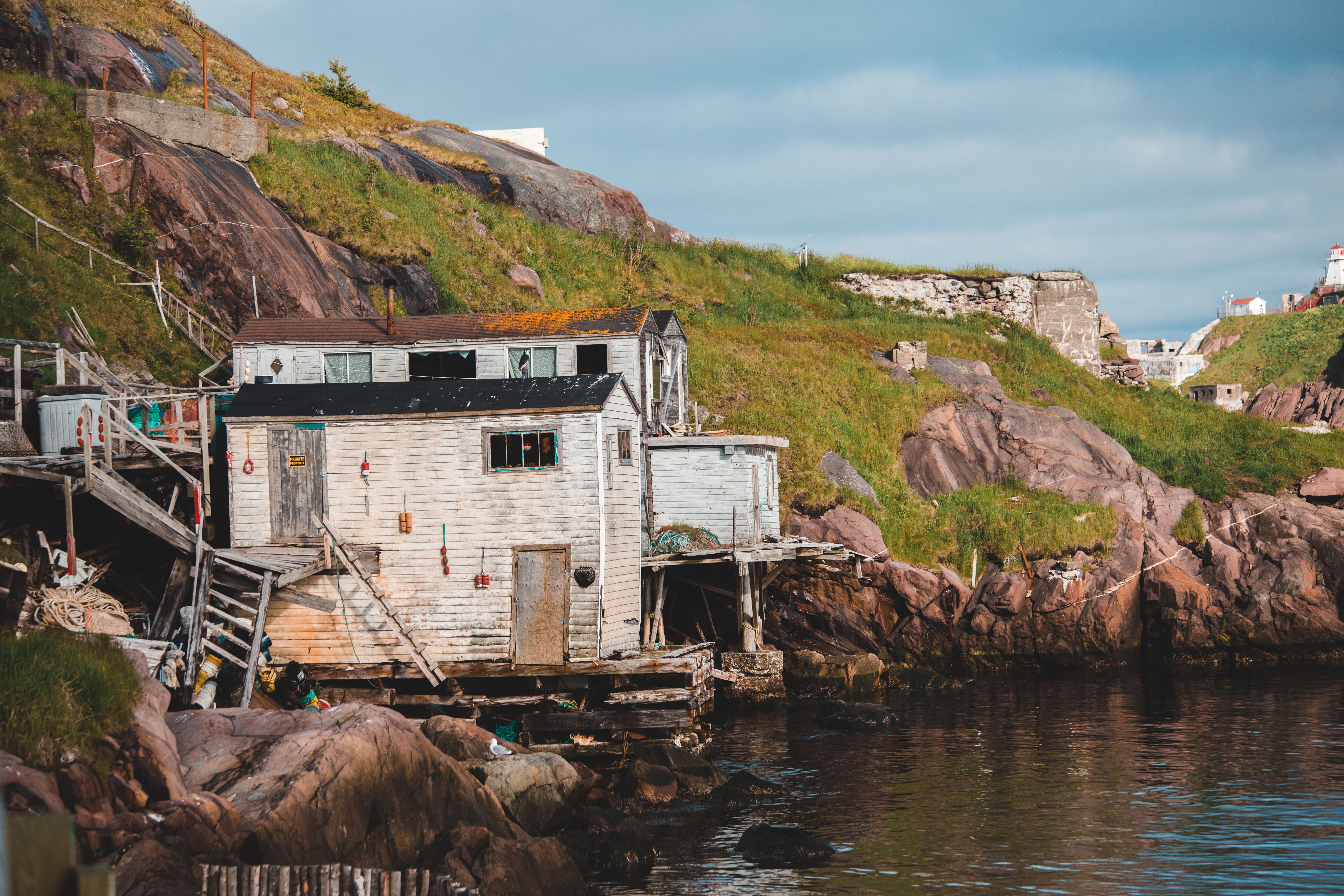 Shabby small house with damaged ladders · Free Stock Photo