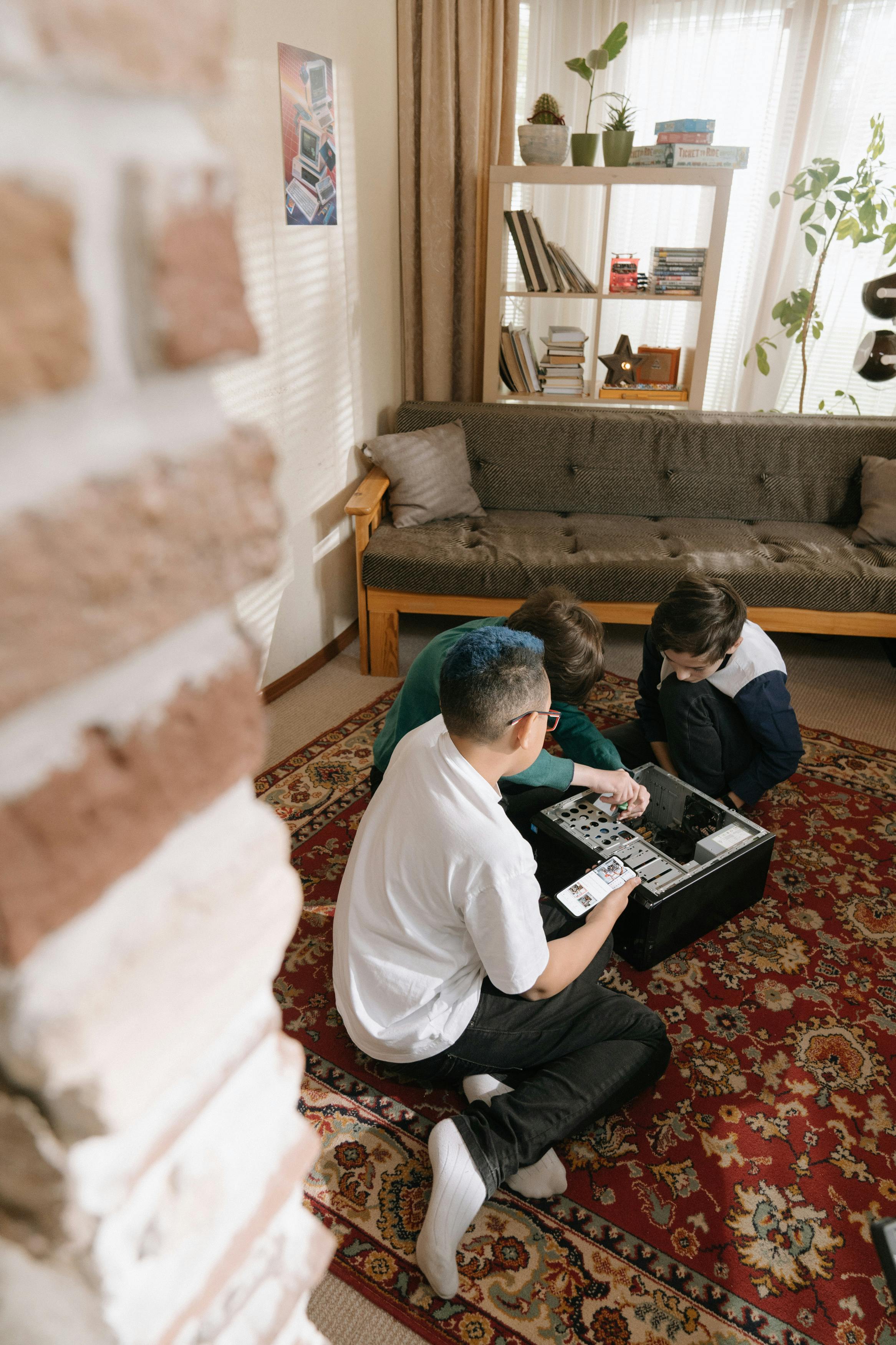 Boy Watching Video Using Laptop · Free Stock Photo