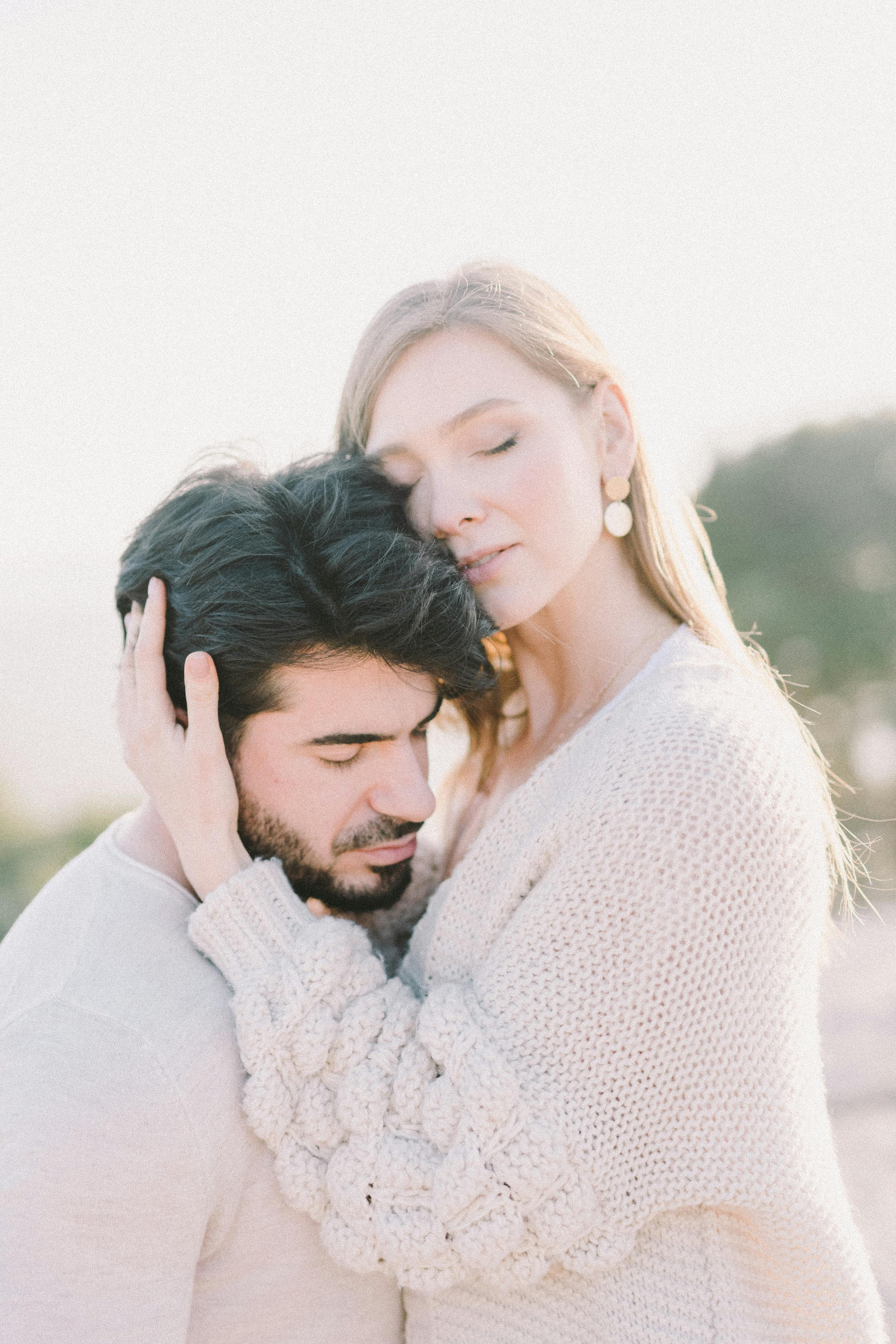 Woman Hugging Her Boyfriend on the Promenade on a Cloudy Day · Free ...