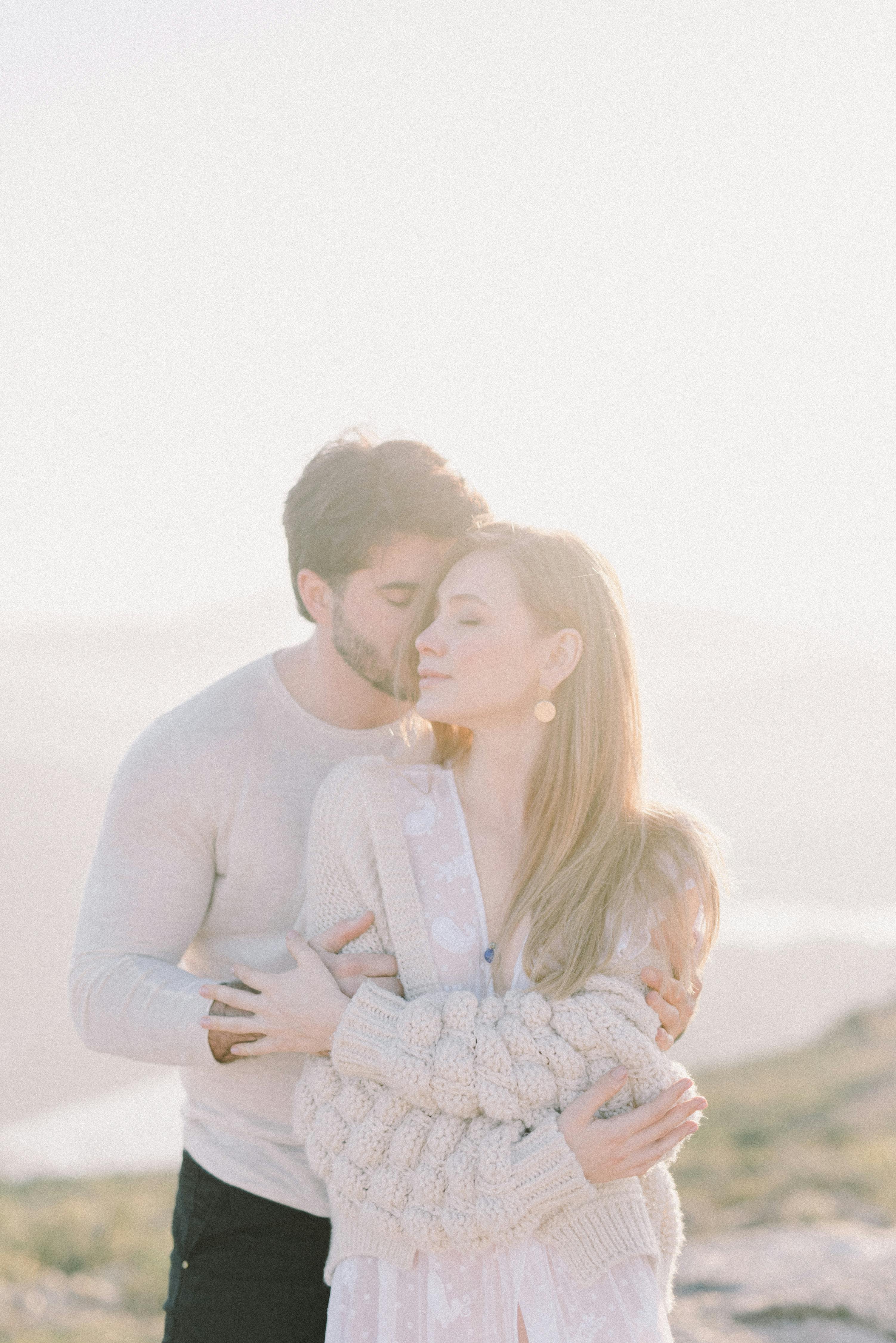 Woman Hugging Her Boyfriend on the Promenade on a Cloudy Day · Free ...