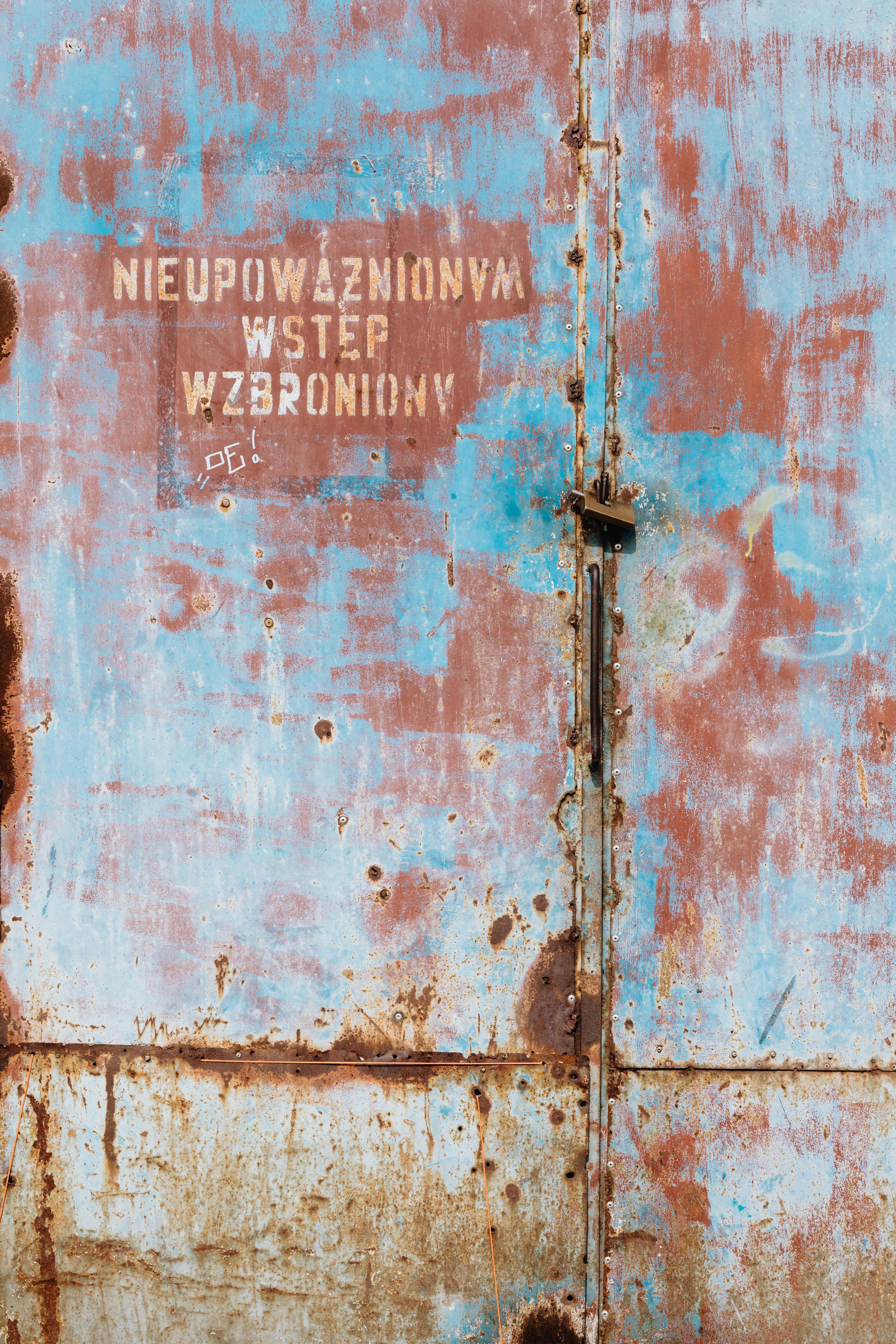 Rusty Metal Gate with a Padlock · Free Stock Photo