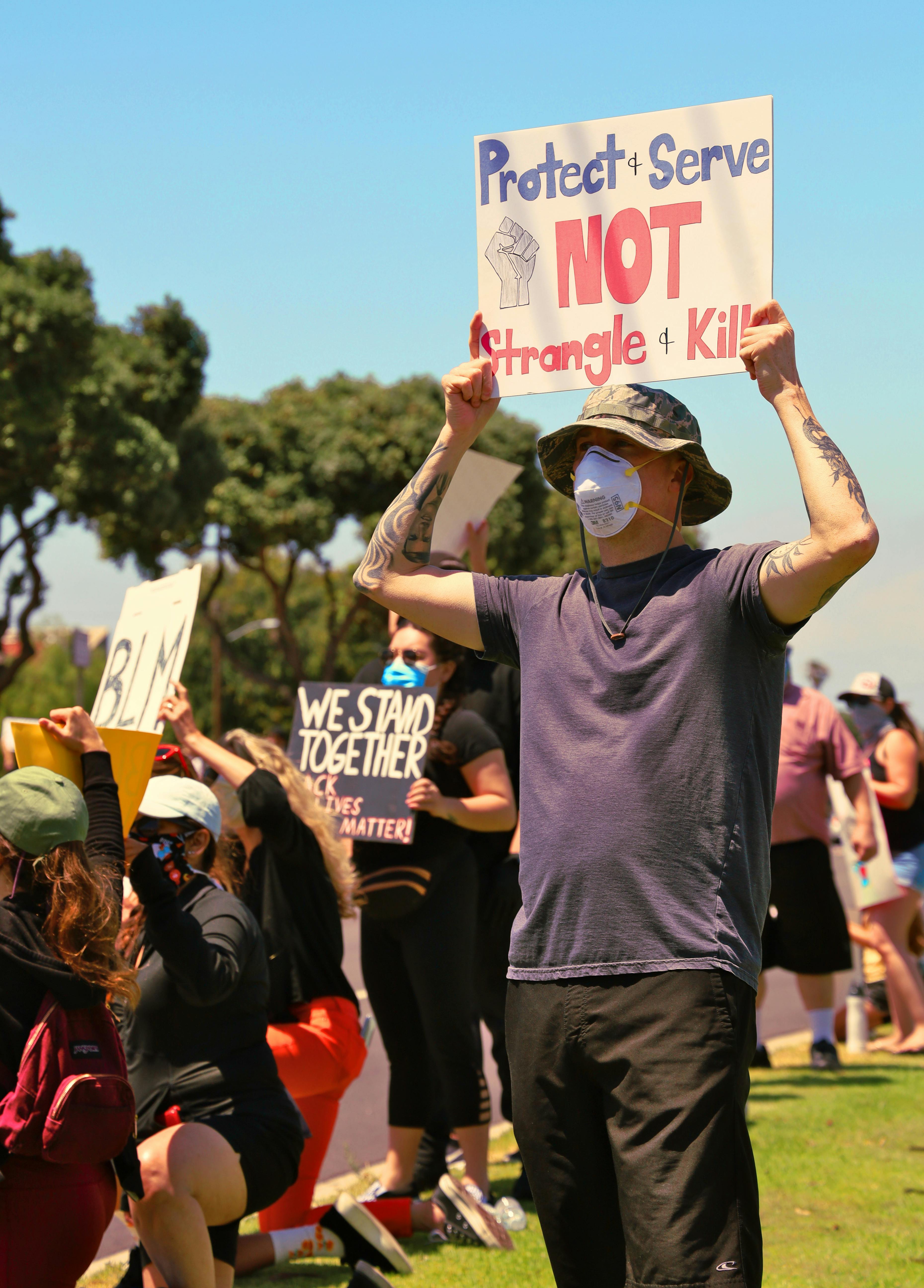 Protesters Holding Signs · Free Stock Photo