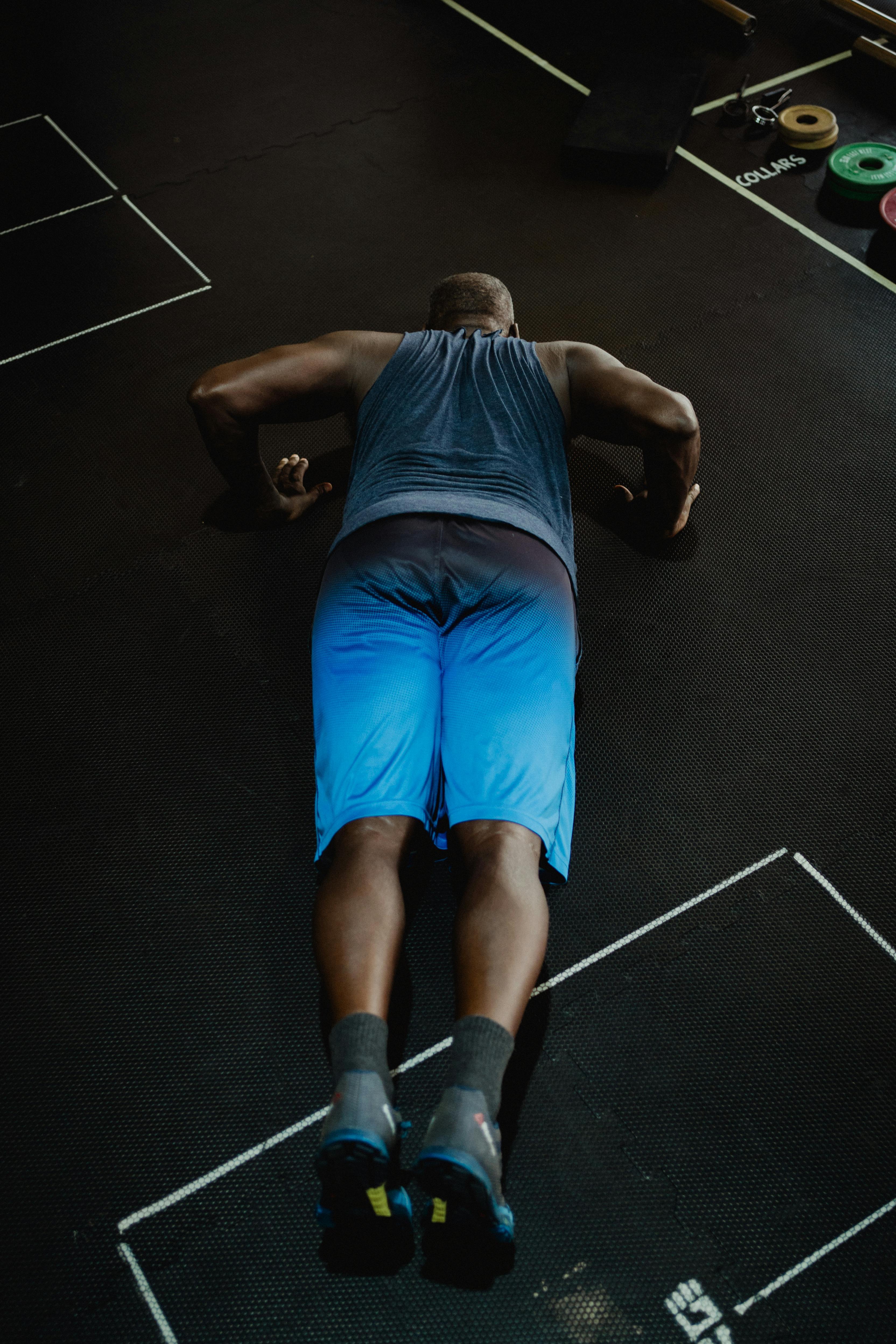 Woman Doing Push-Ups · Free Stock Photo
