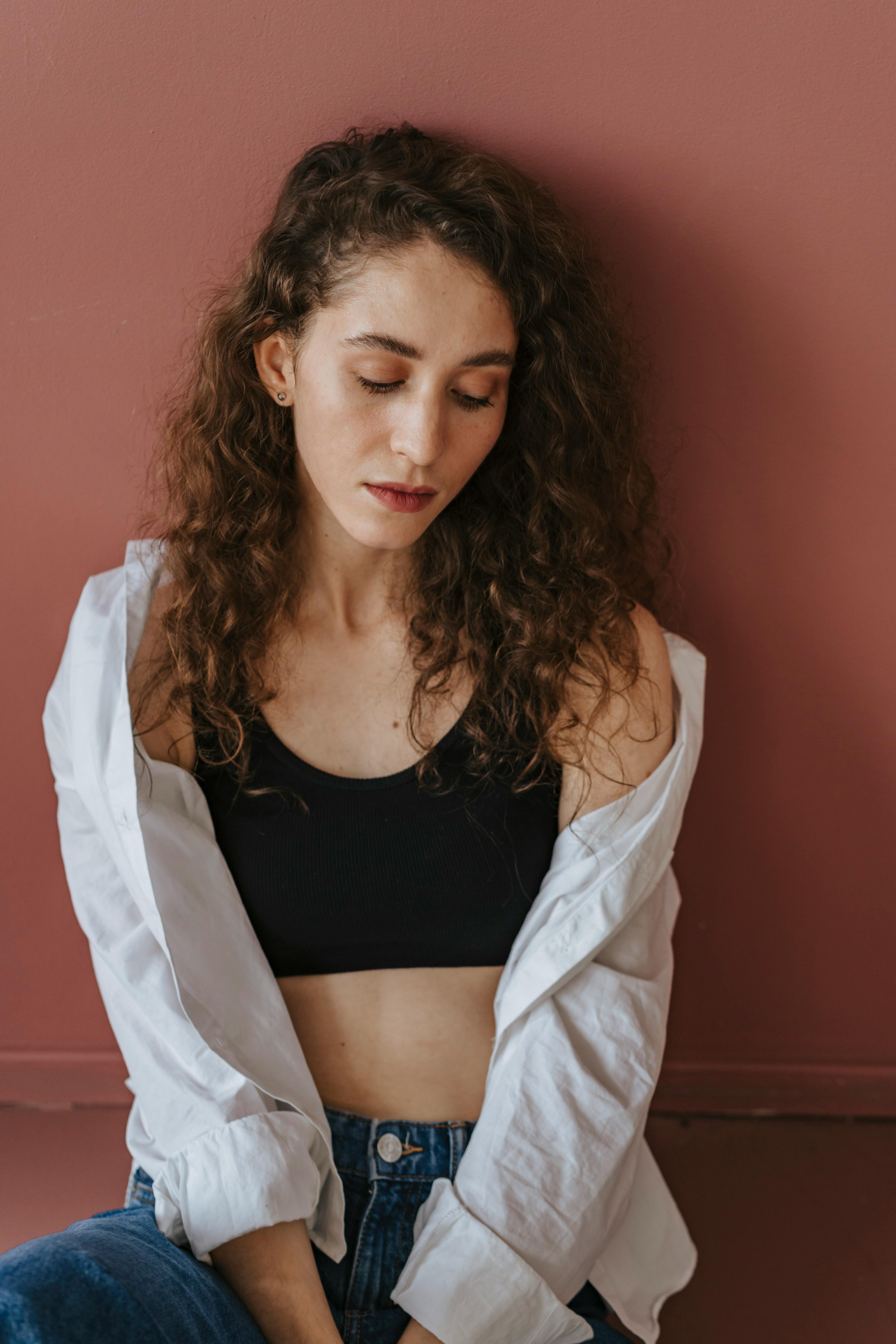 Medium Shot Of Woman Not Looking At The Camera · Free Stock Photo