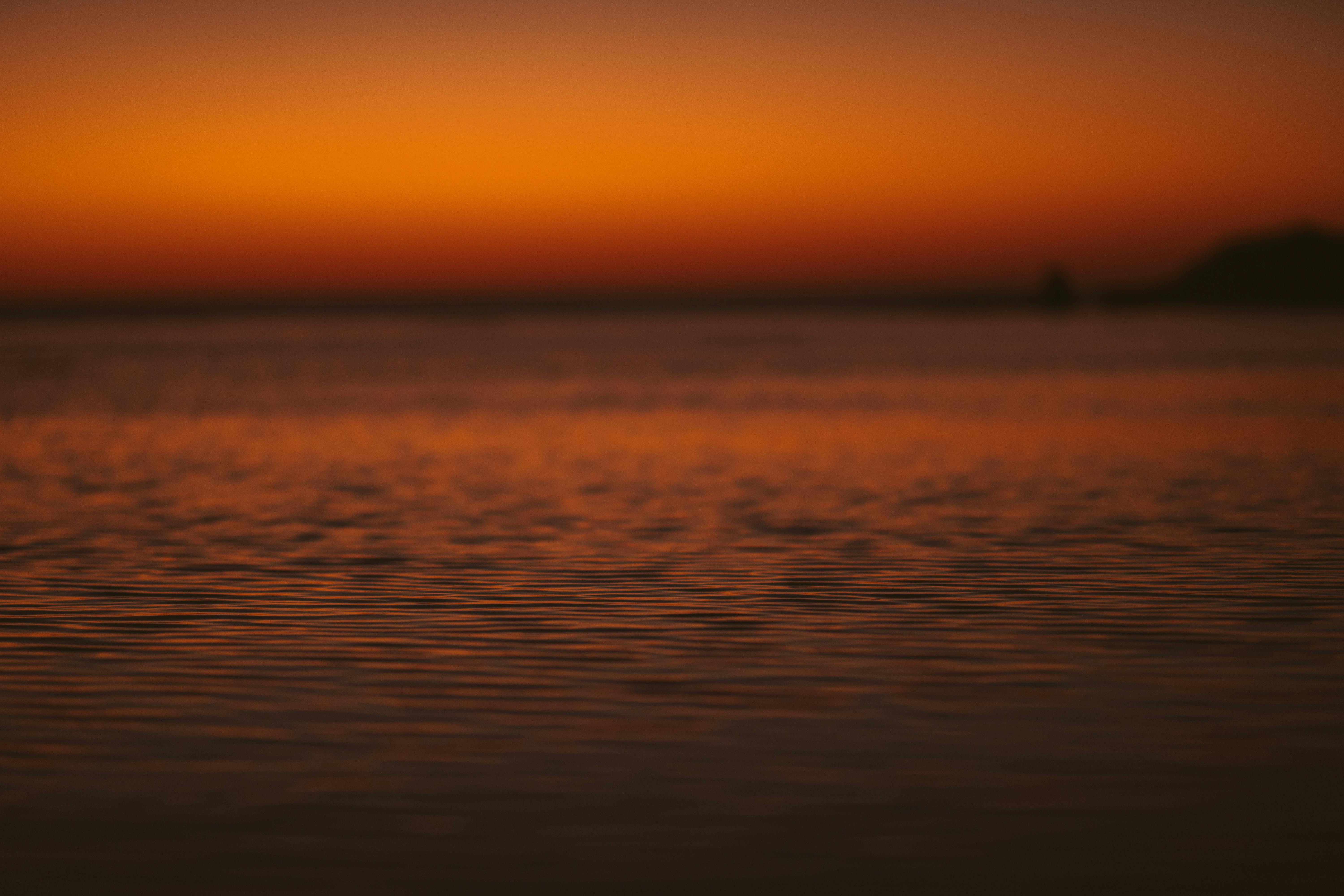 Body Of Water During Sunset · Free Stock Photo