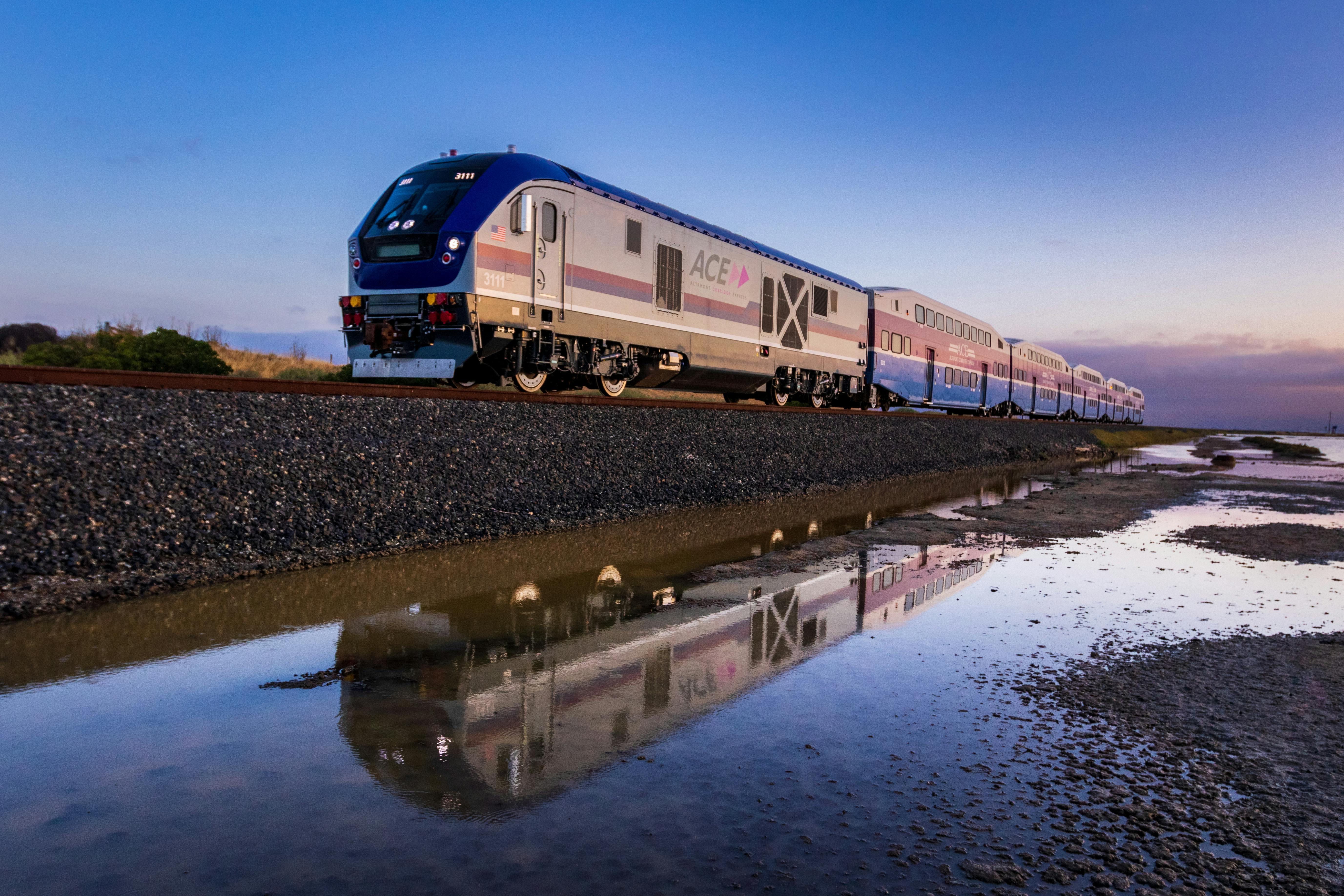 Blue and Gray Train on Railway Track · Free Stock Photo