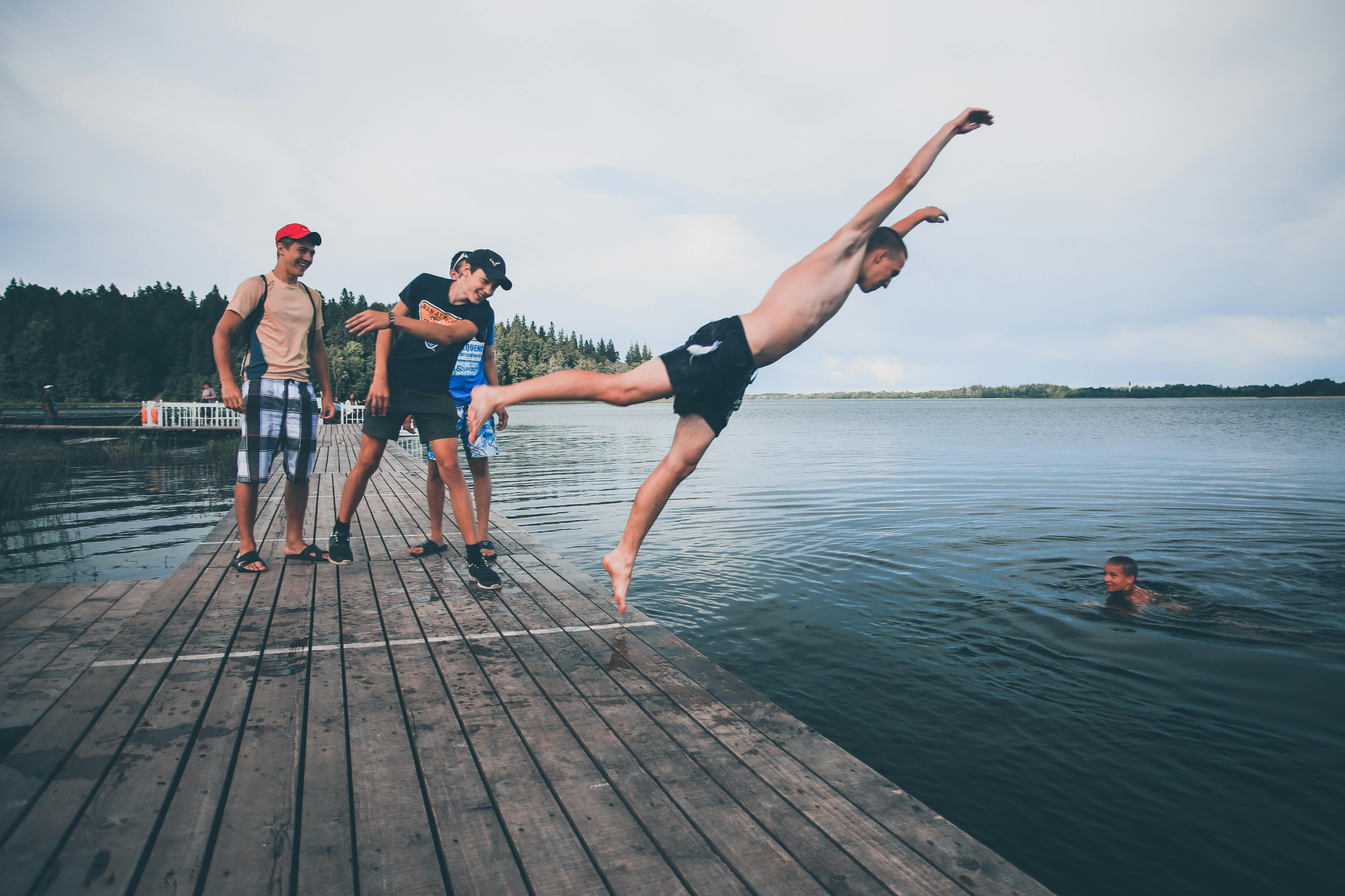 A Man Diving in the Ocean · Free Stock Photo