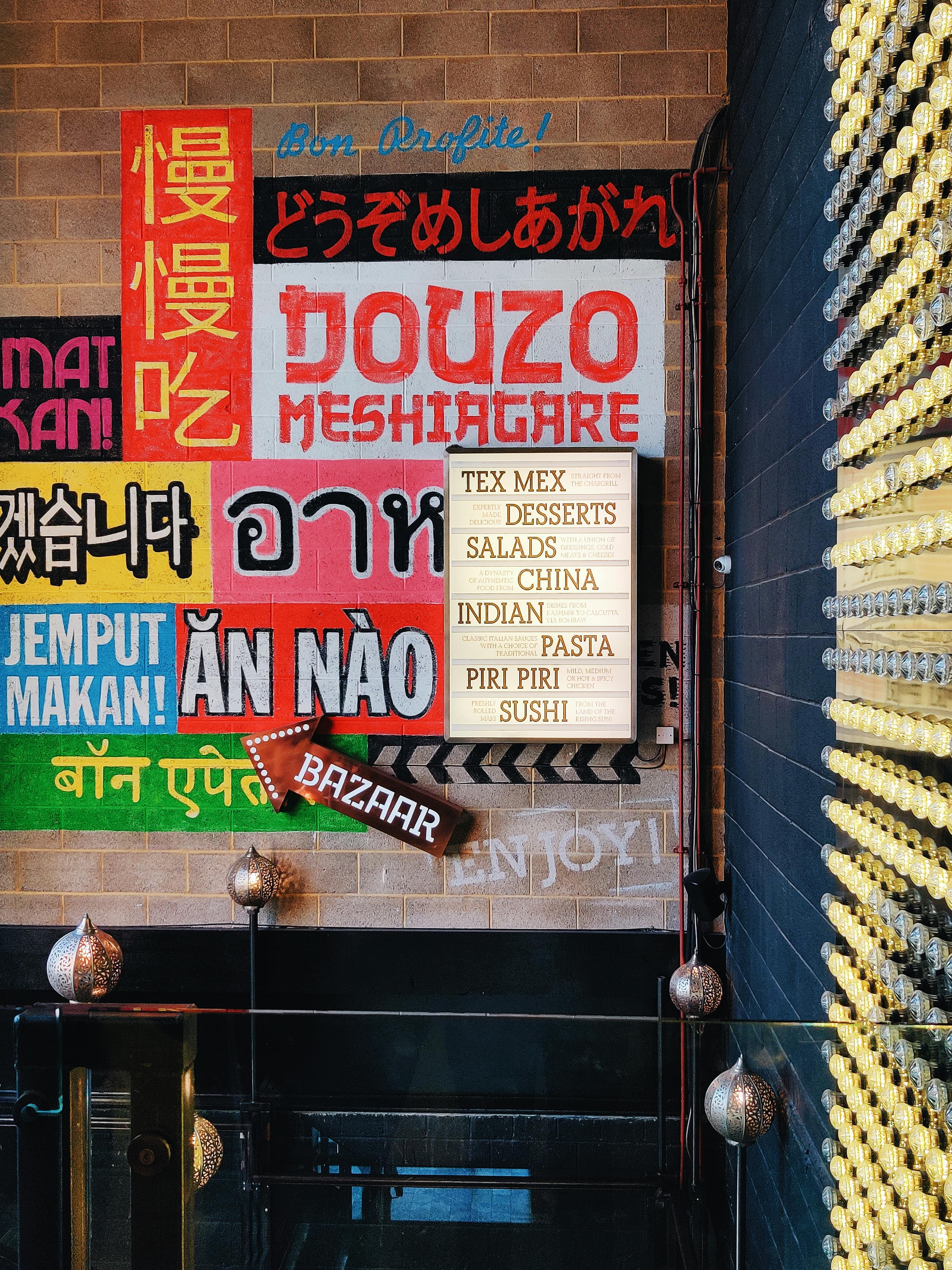 Posters On Wall Of A Restaurant · Free Stock Photo