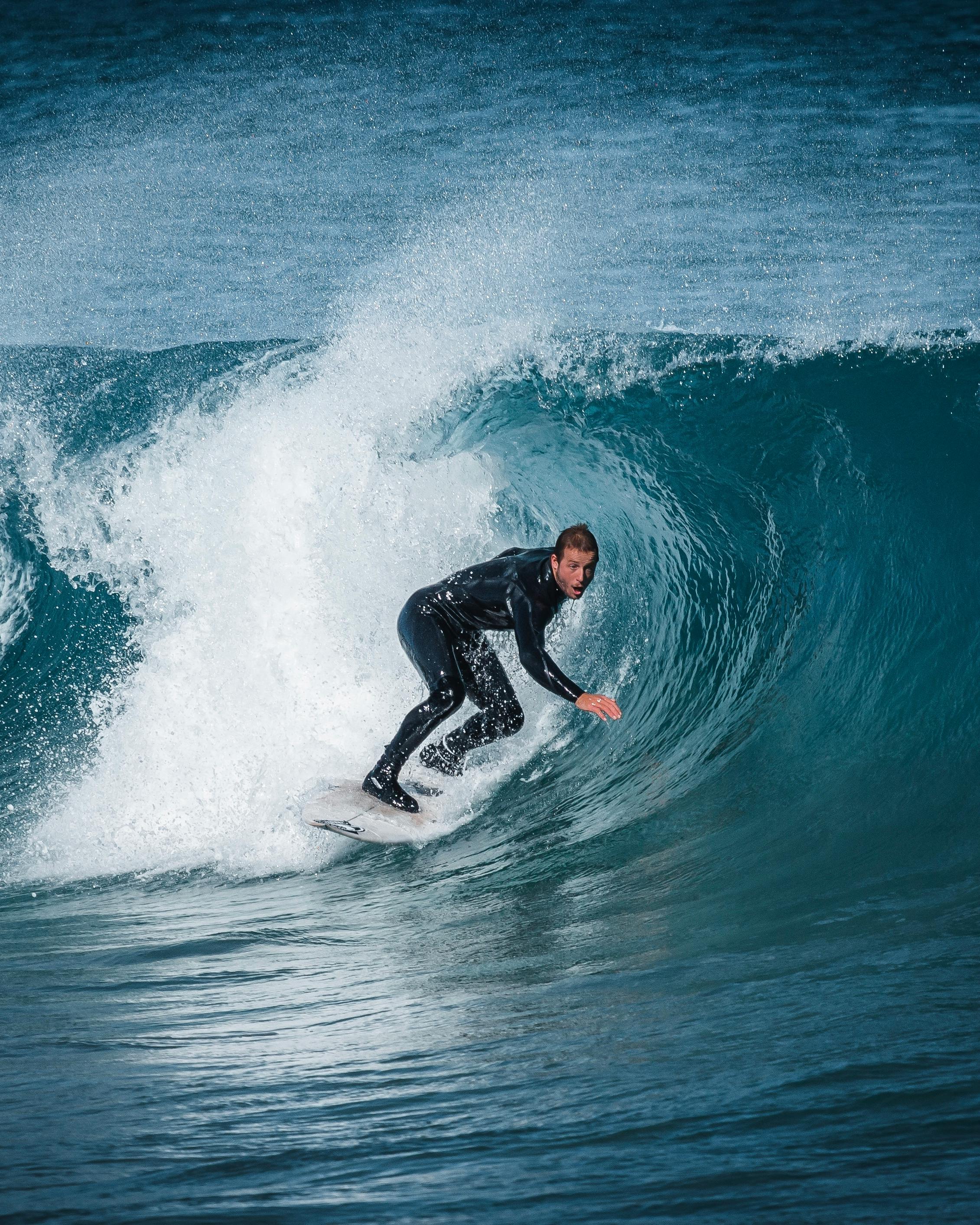 Man Surfing on Waves · Free Stock Photo