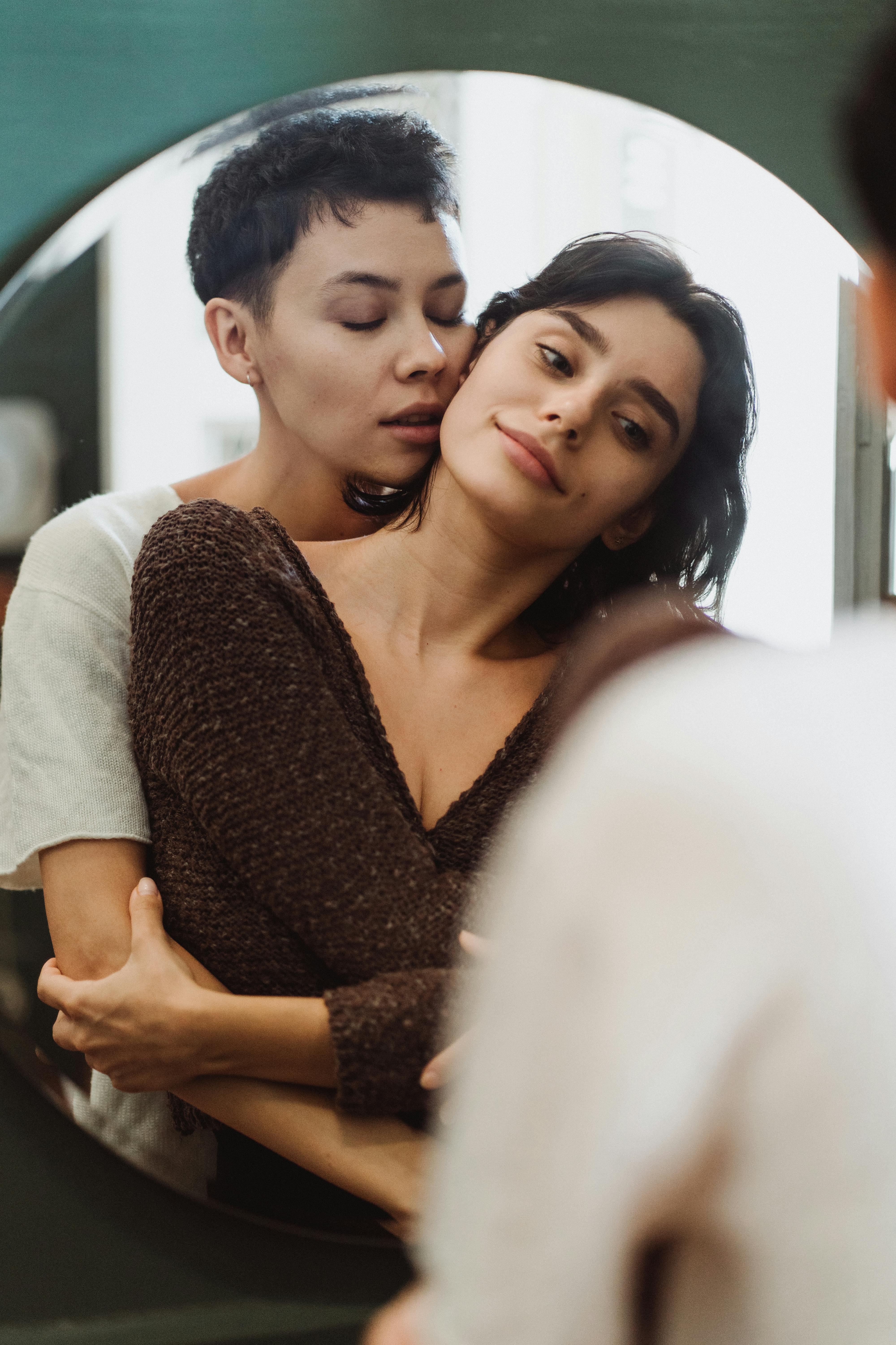 Photo of Two Women Reflecting in the Mirror · Free Stock Photo
