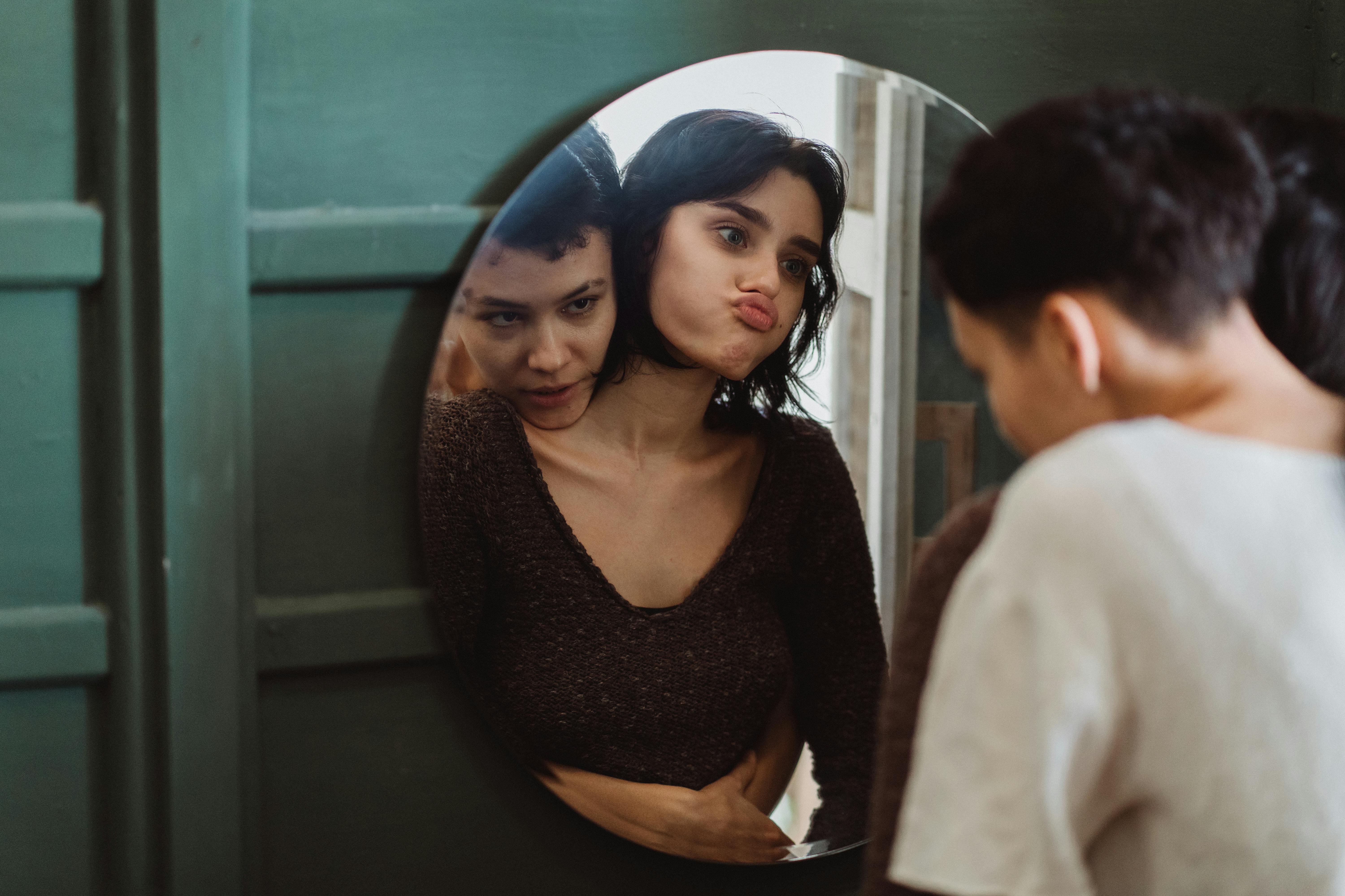 Couple Reflection in Mirror · Free Stock Photo