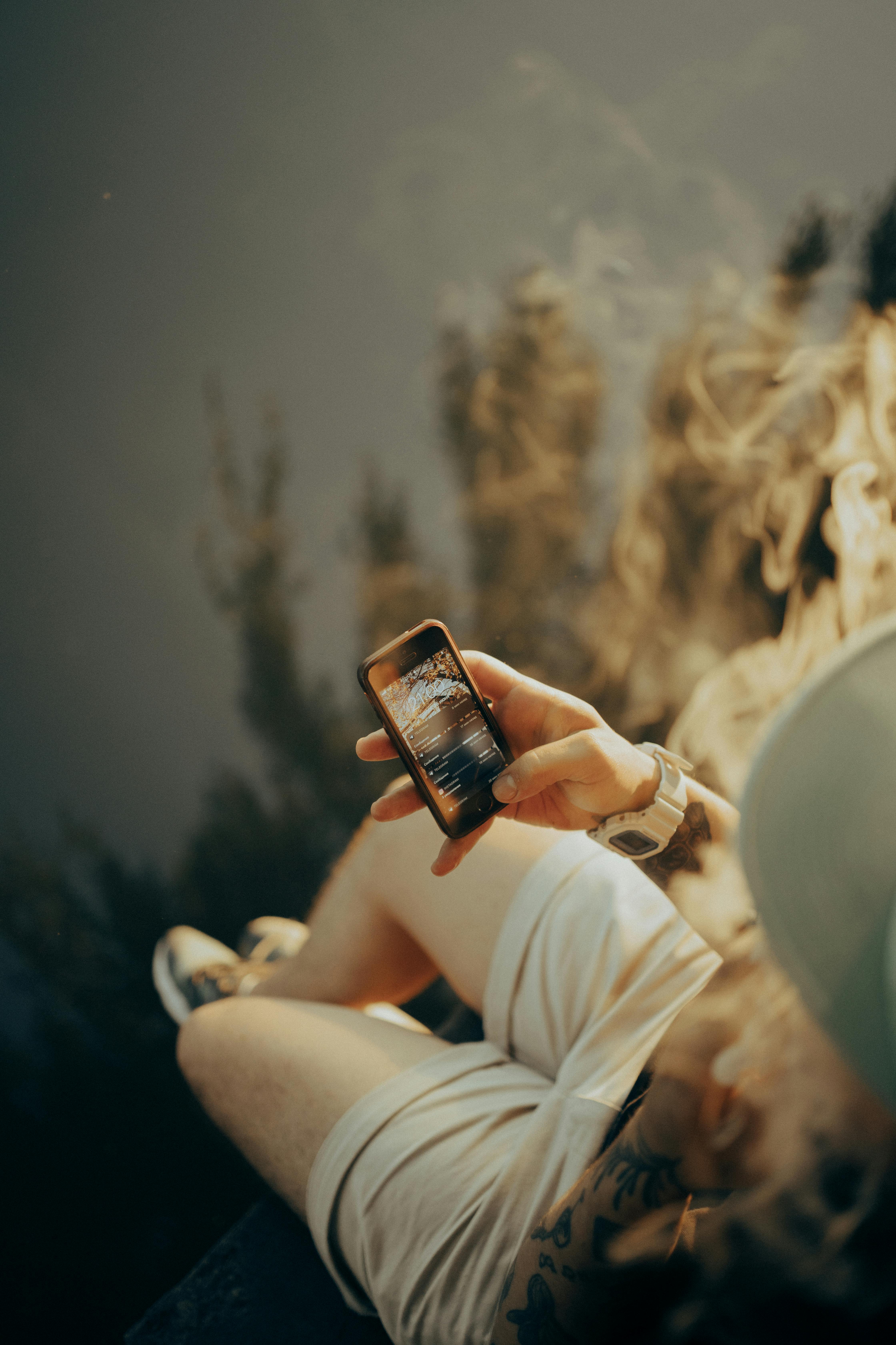 A Person Using His Smartphone · Free Stock Photo