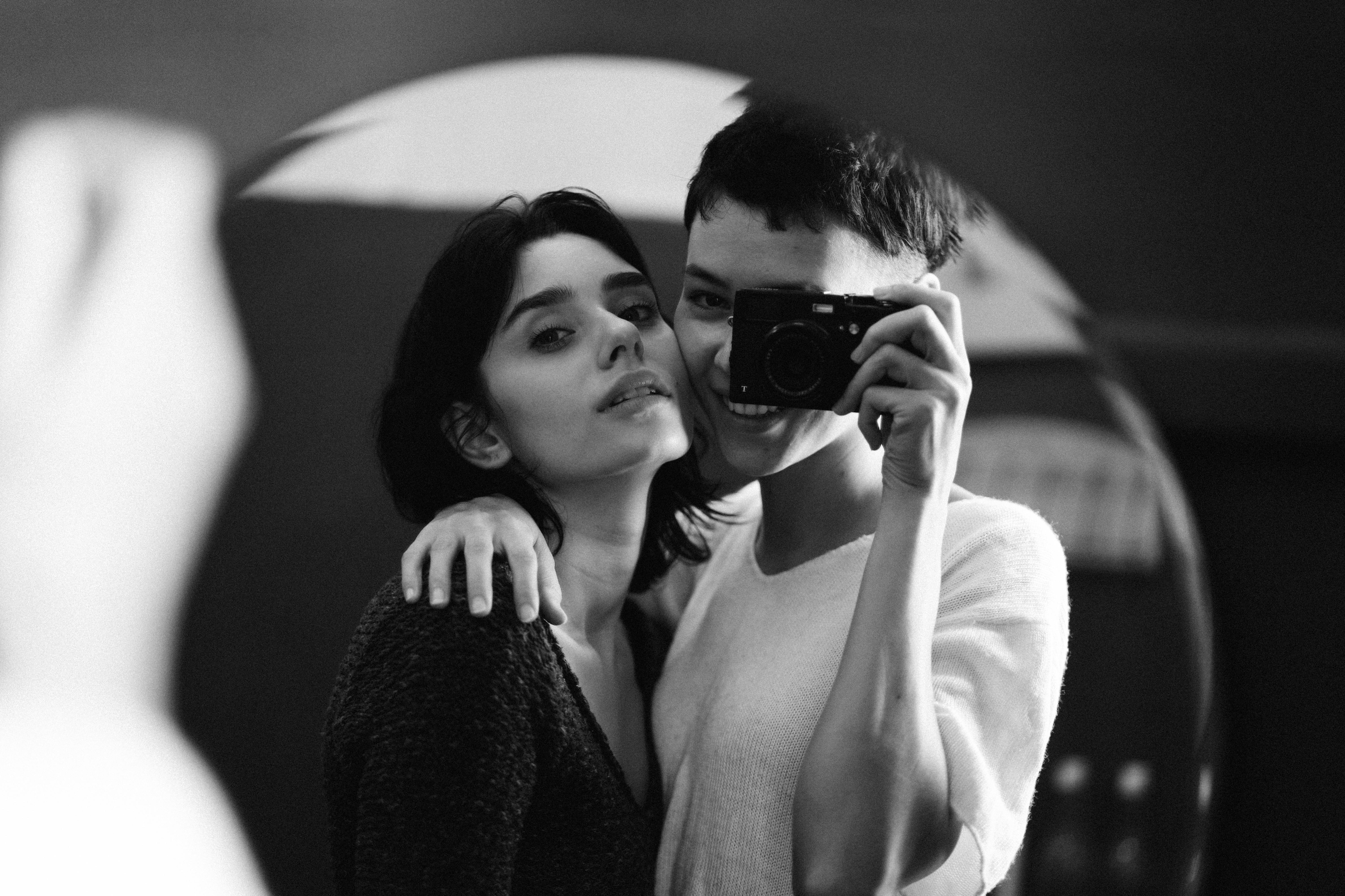 Couple Taking Picture in Mirror · Free Stock Photo