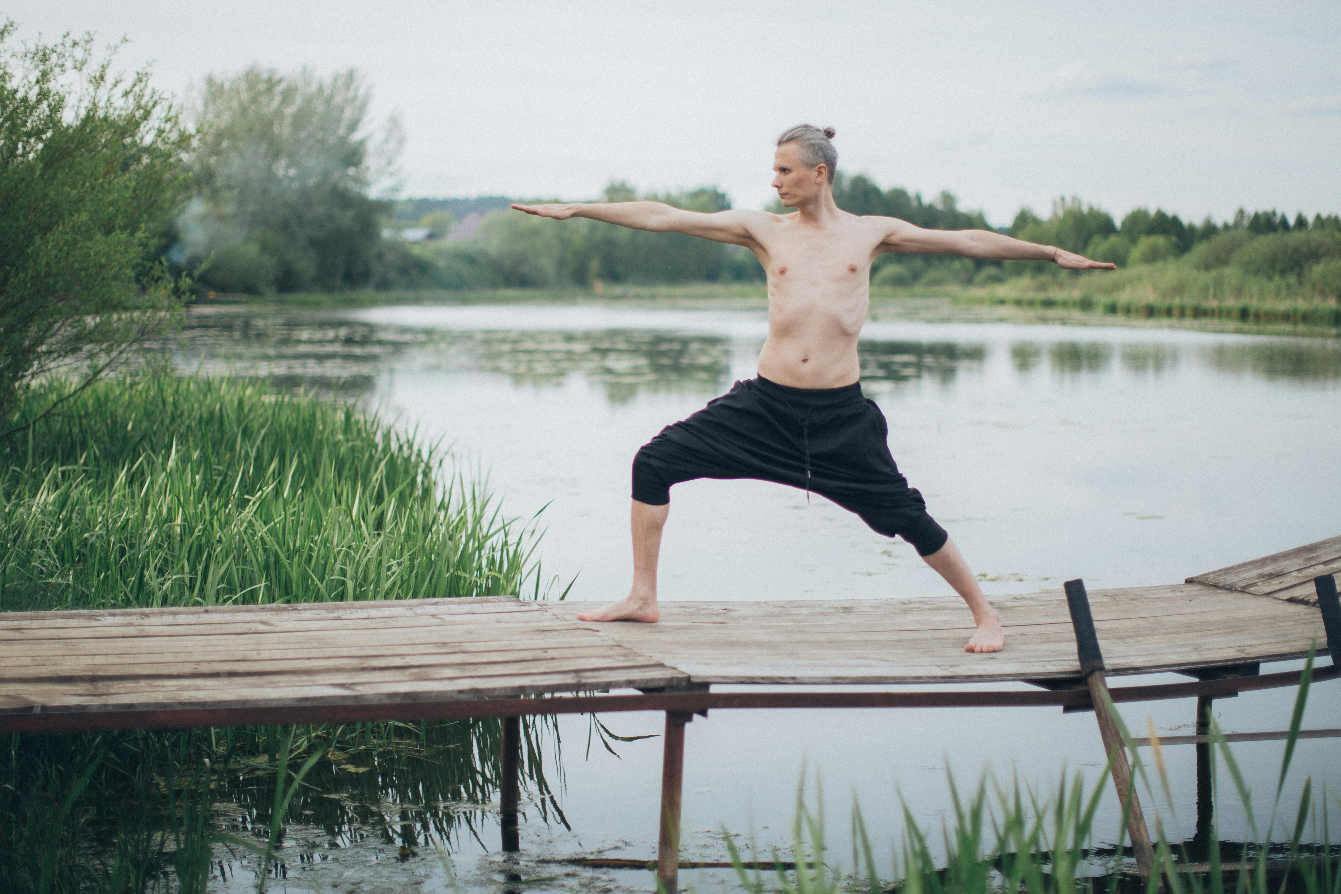 Man Practicing Sport on Pier · Free Stock Photo