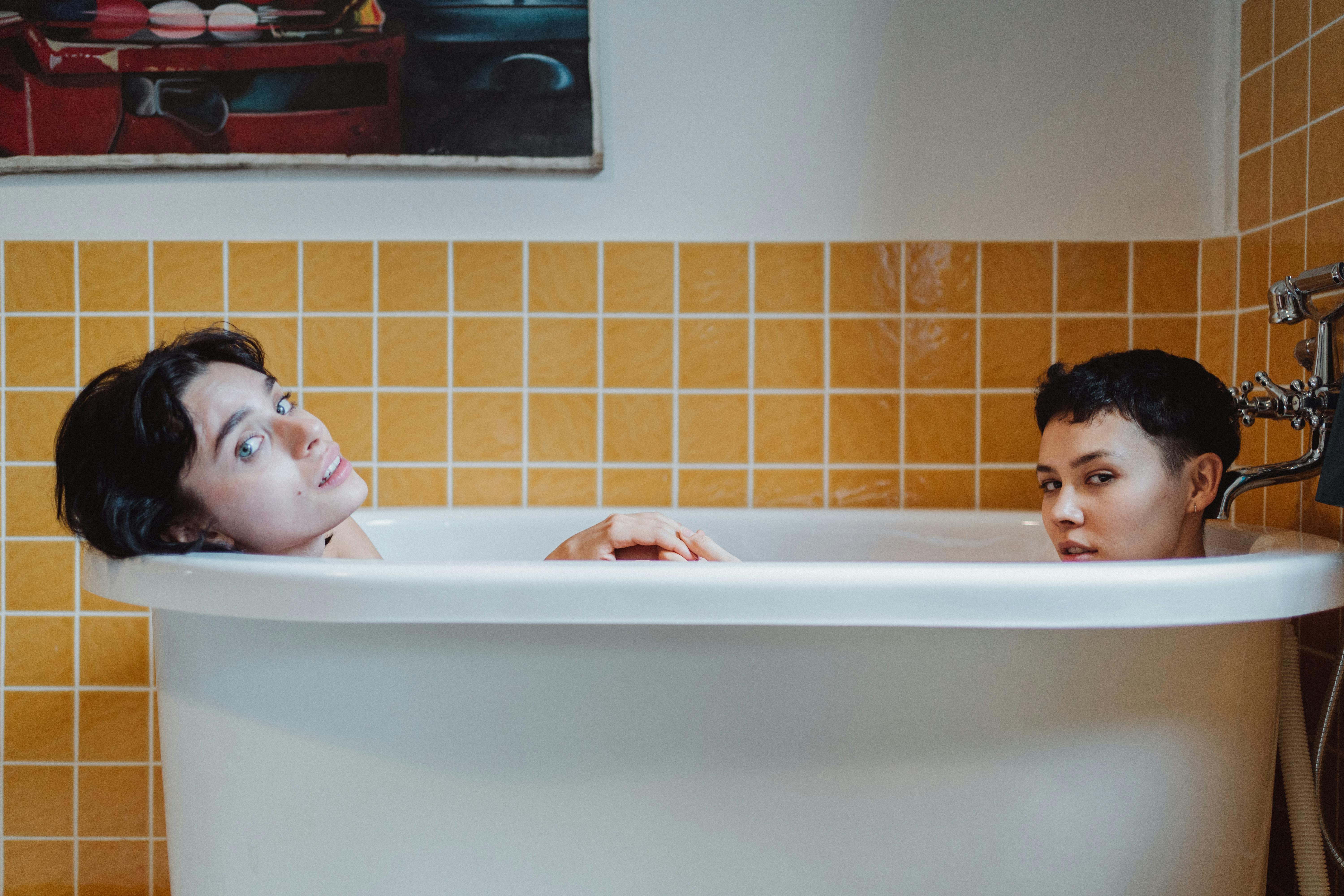 Two Women Taking a Bath Together · Free Stock Photo
