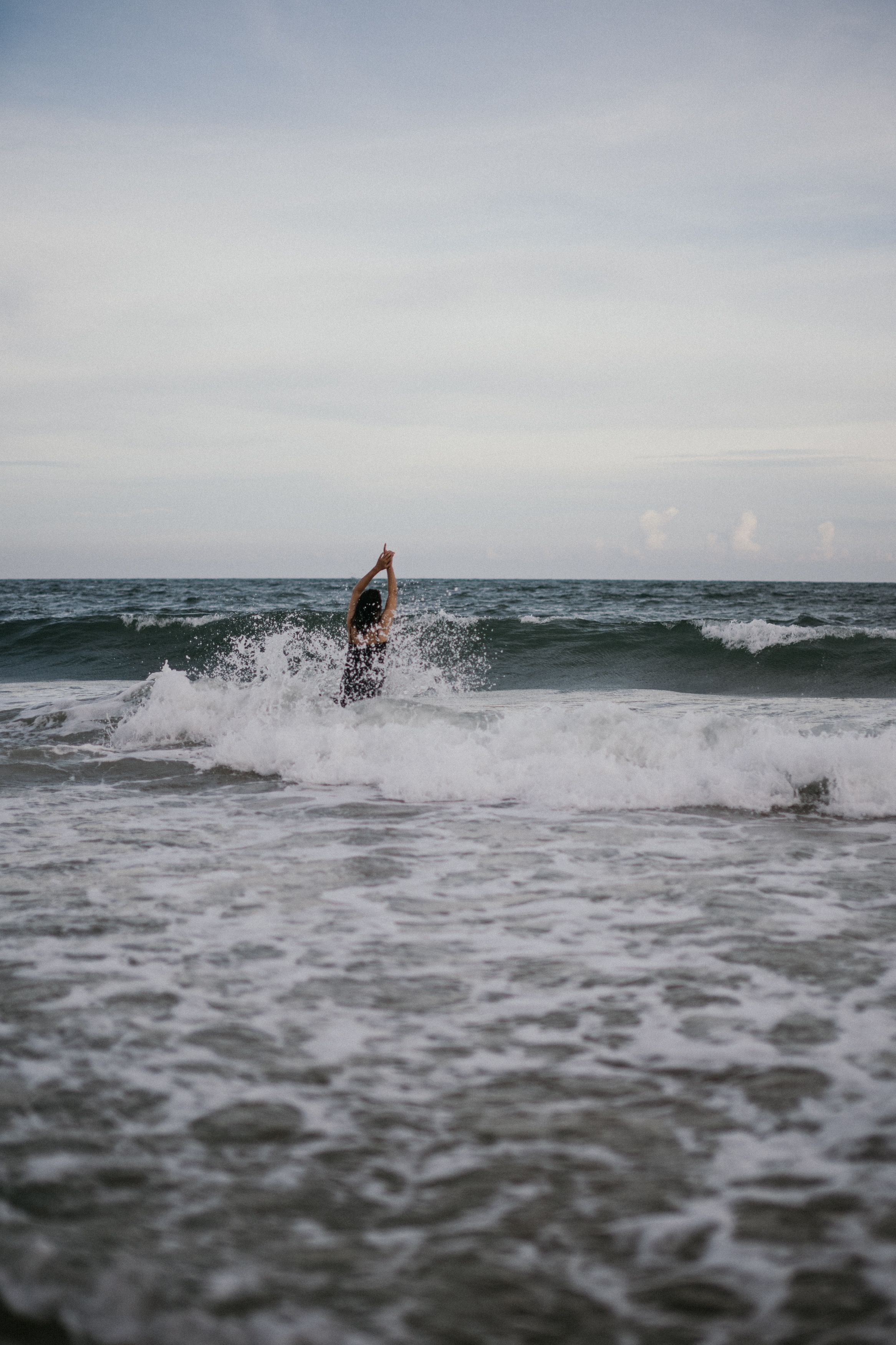 A Person Swimming on the beach · Free Stock Photo