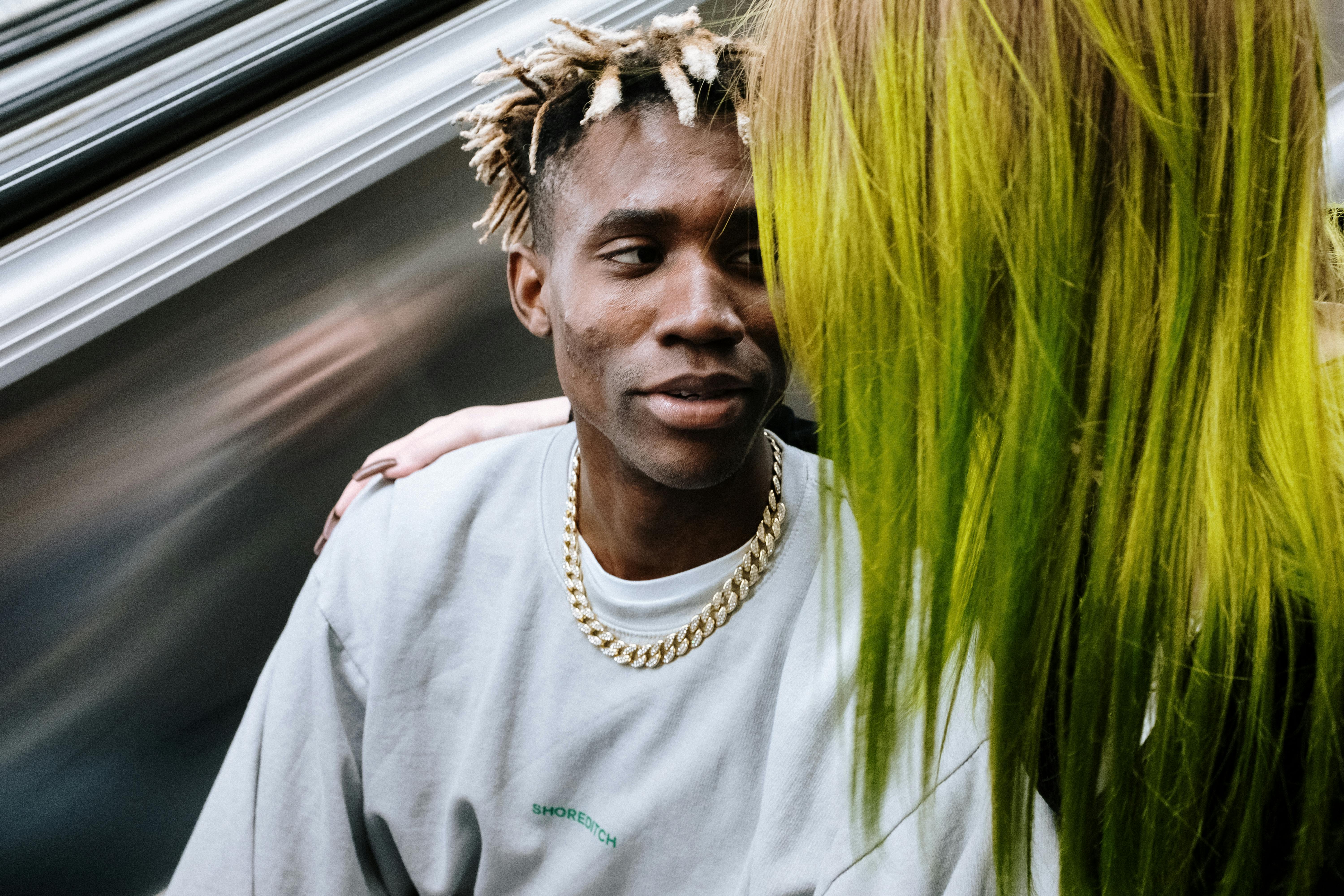 Man in White Crew Neck Shirt With Yellow Hair · Free Stock Photo
