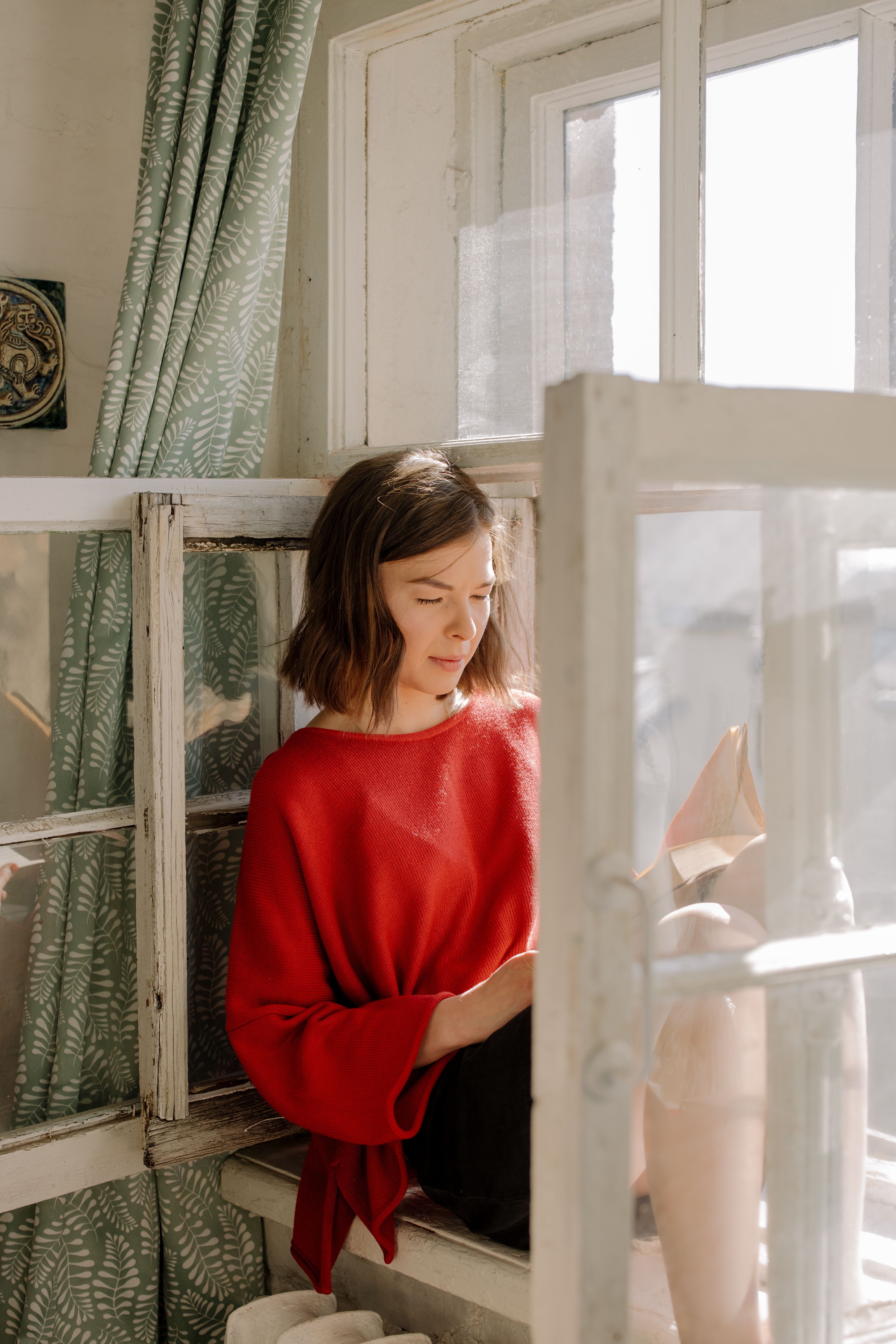 Woman Wearing Blue Dress While Reading a Book · Free Stock Photo
