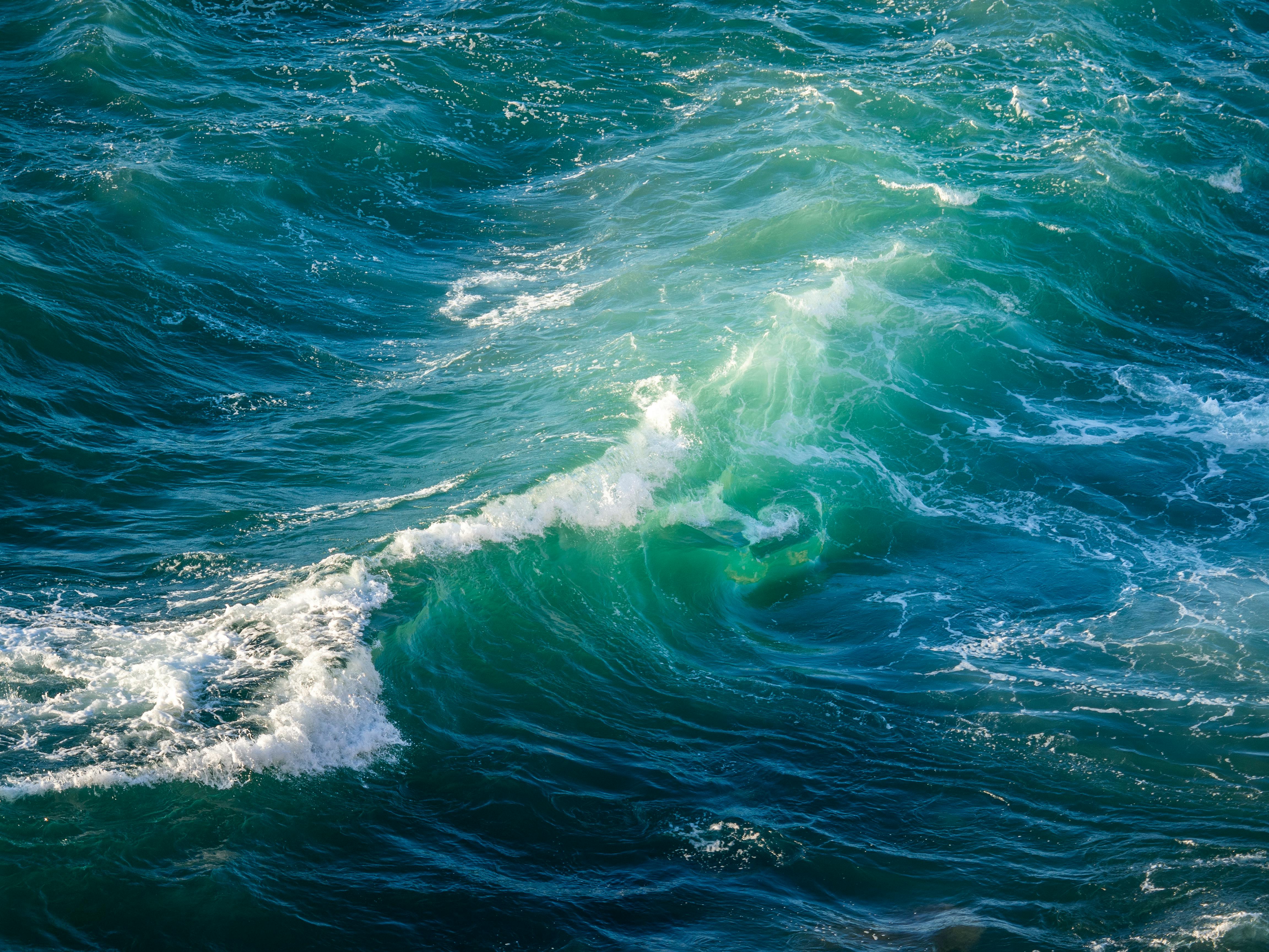 Sea Water Forming Seafoams · Free Stock Photo