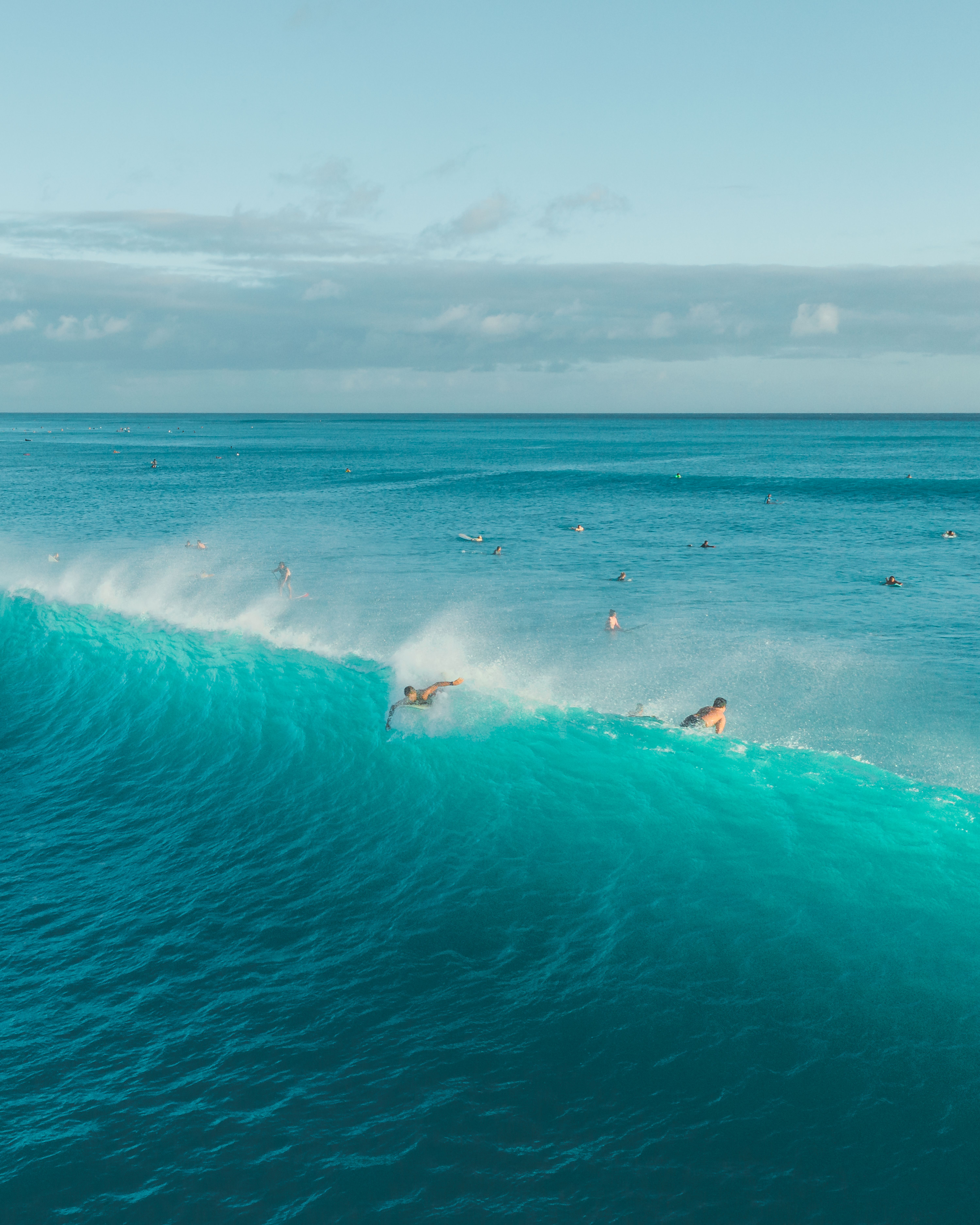 People Surfing on the Sea During Daytime · Free Stock Photo