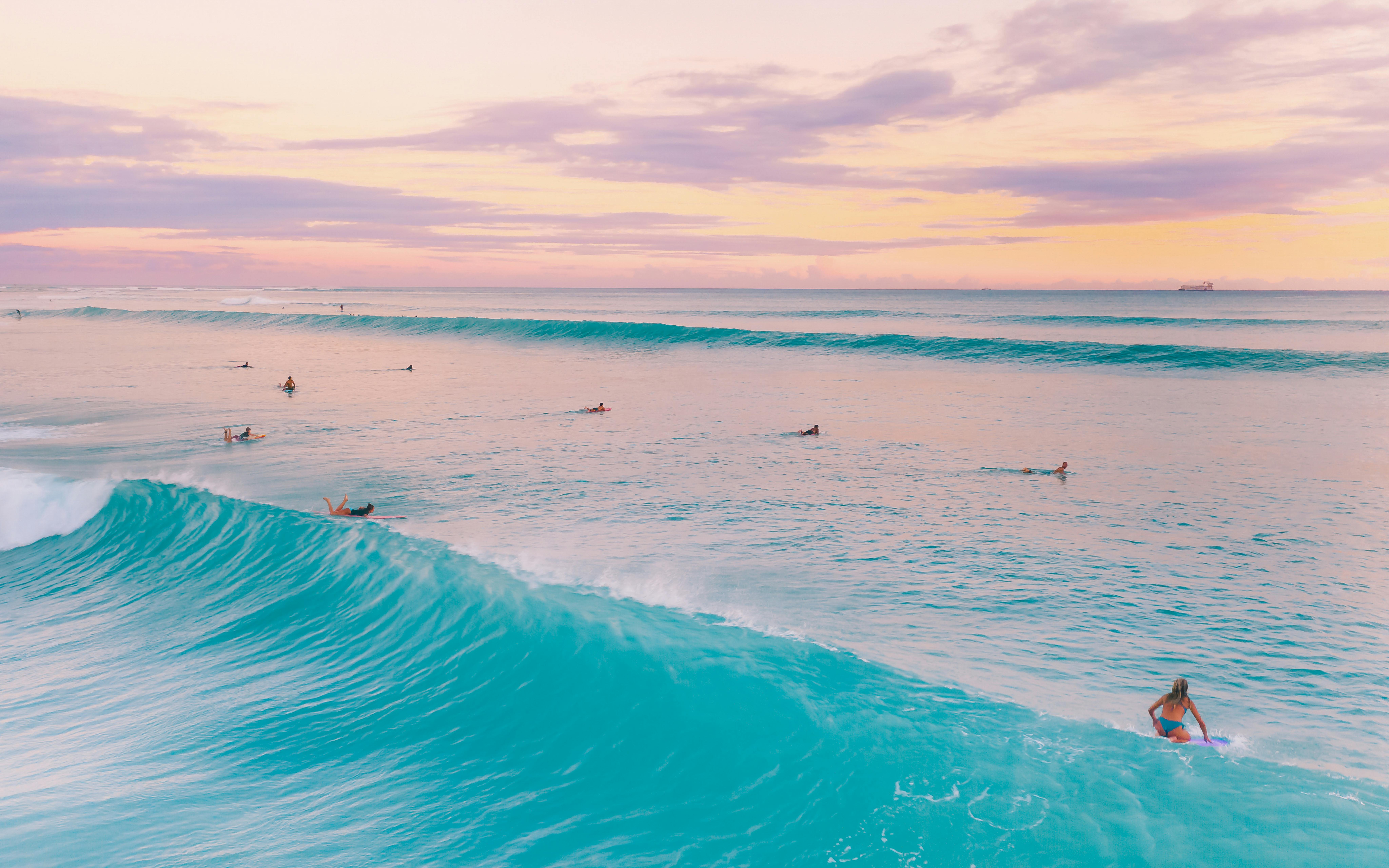 People Surfing on Sea Waves · Free Stock Photo