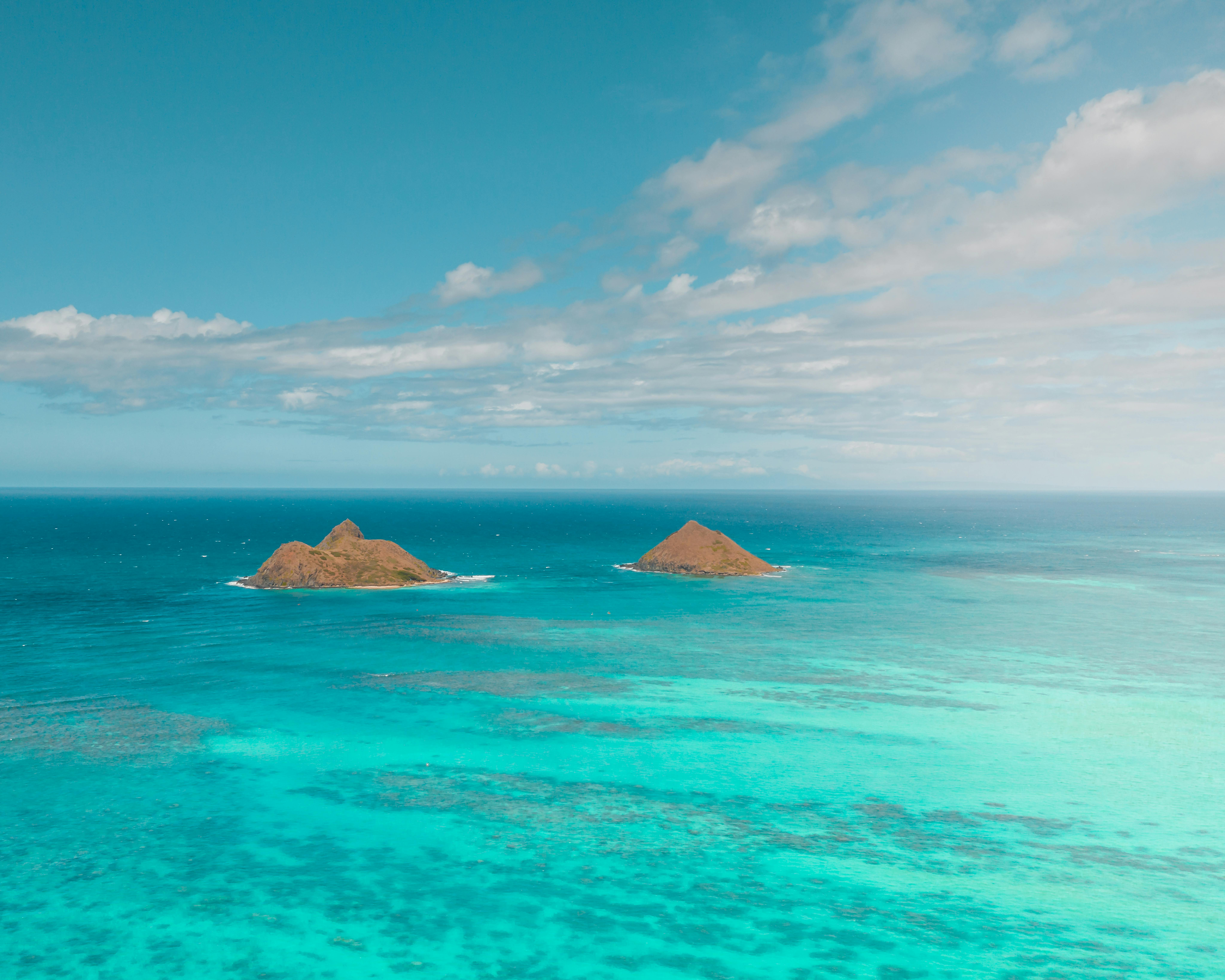 Islands on Turquoise Water Under a Blue Sky With White Clouds · Free ...