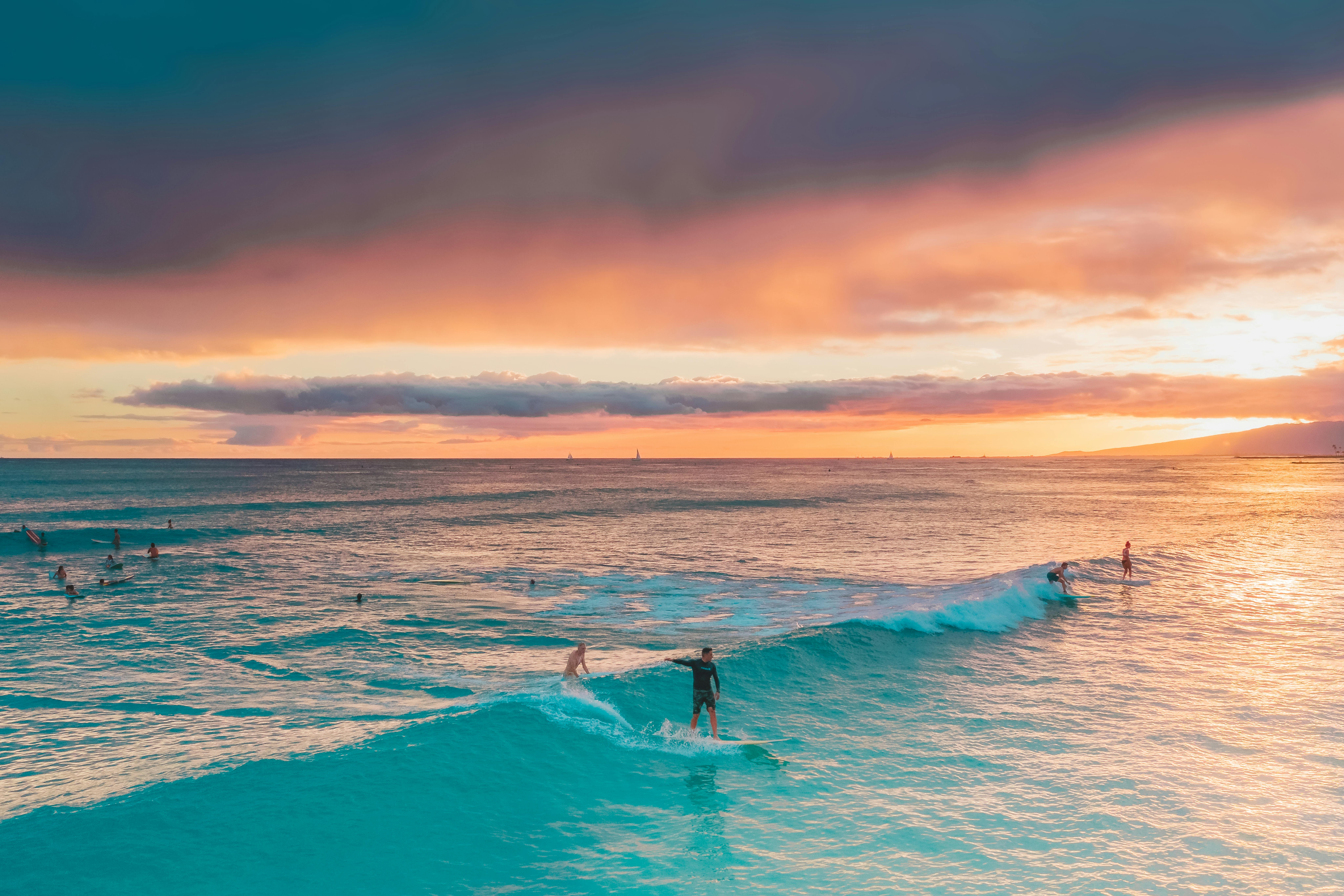 People Lying on an Inflatable Floater on the Beach · Free Stock Photo