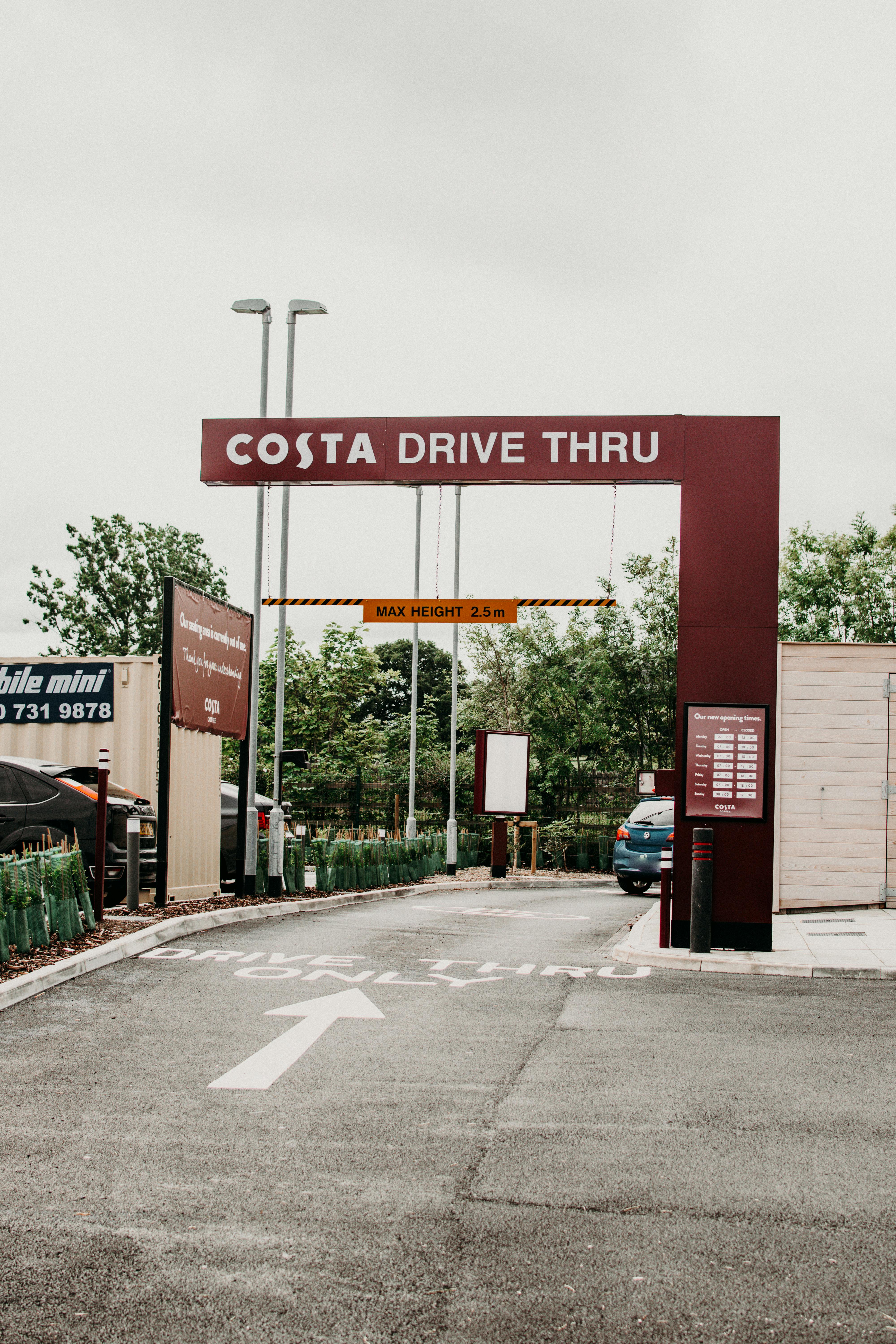 A Car Passing through Costa Drive Thru · Free Stock Photo