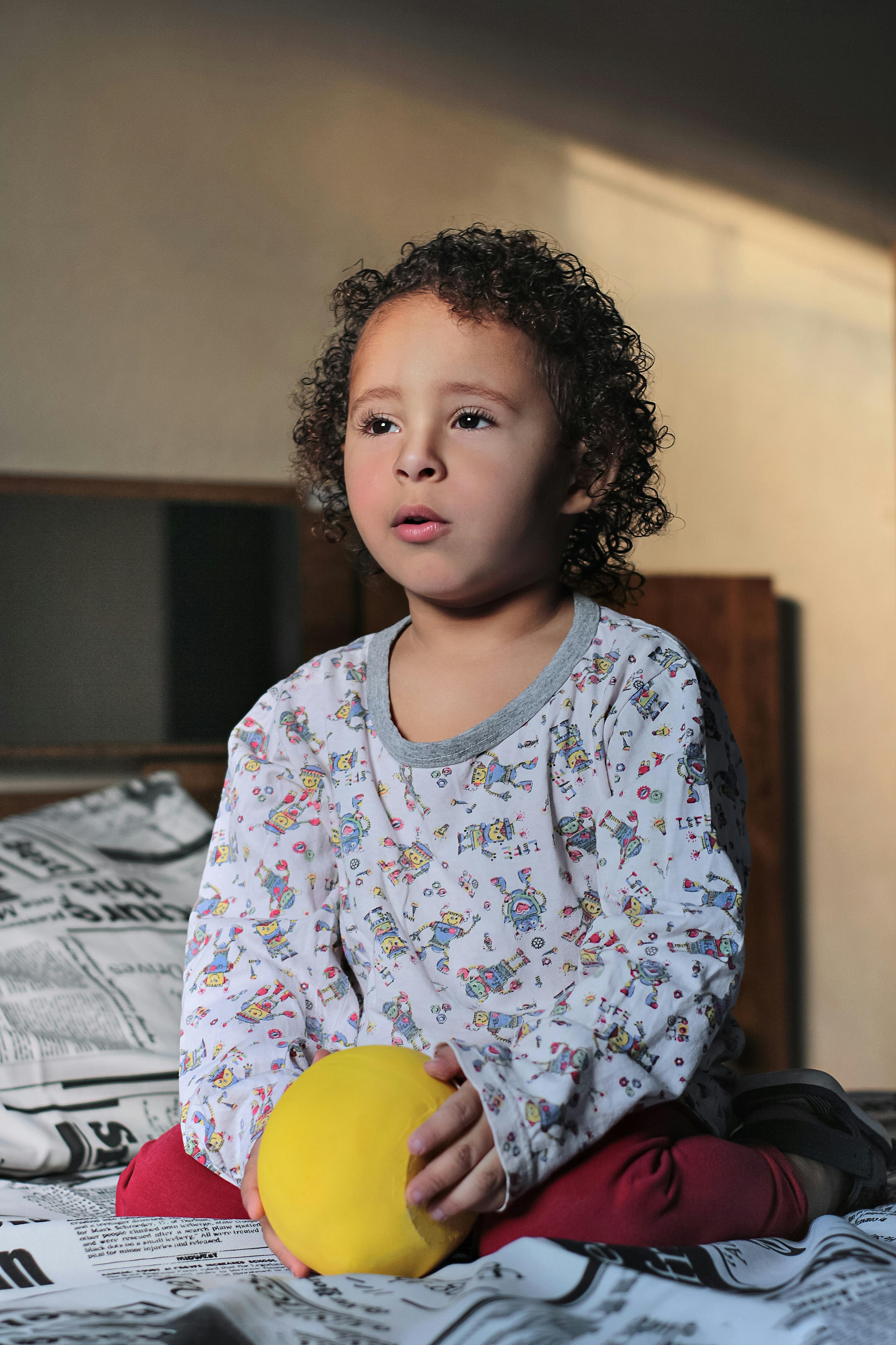 Toddler Wearing Diaper Standing Near Window · Free Stock Photo