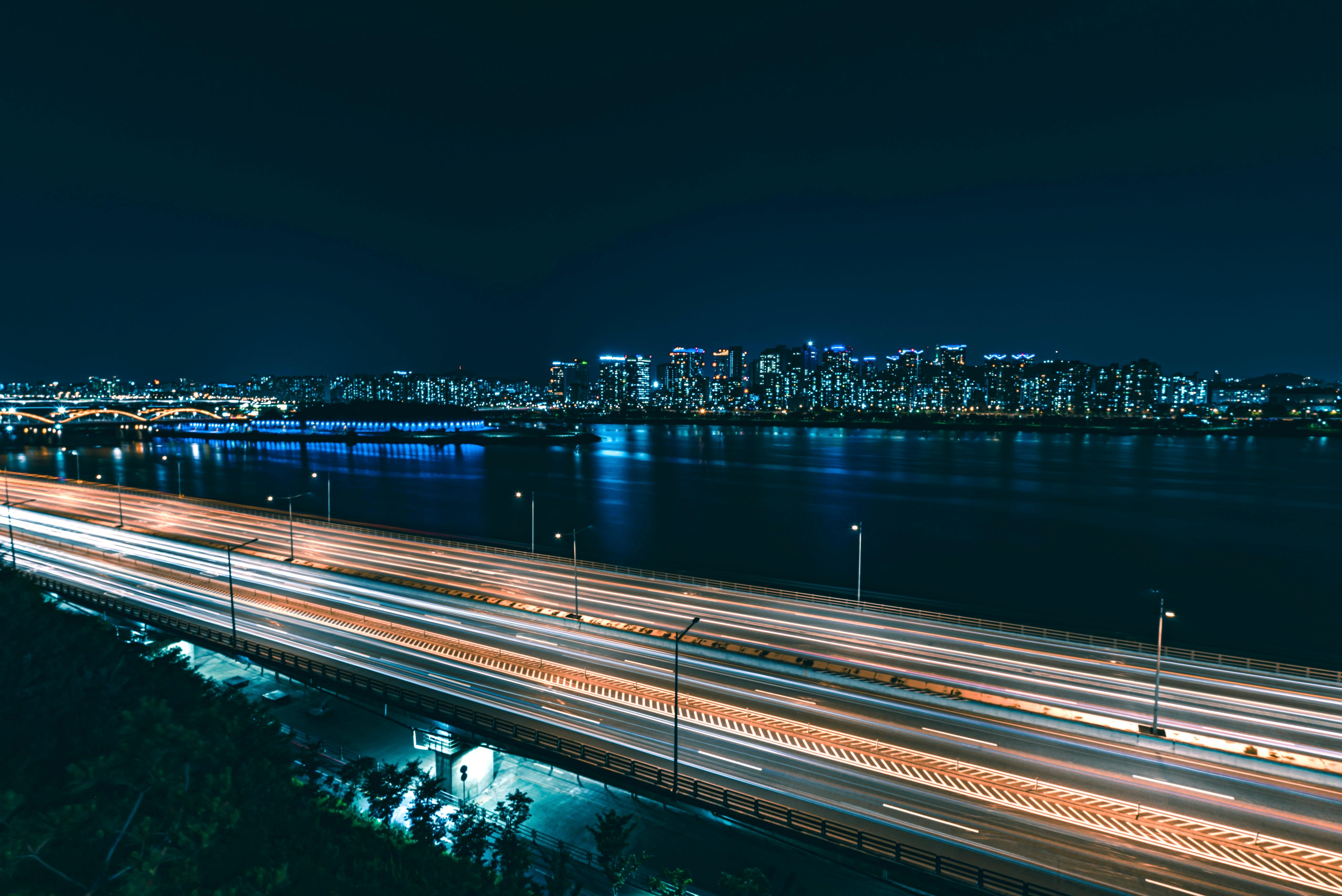City Buildings During Night Time · Free Stock Photo