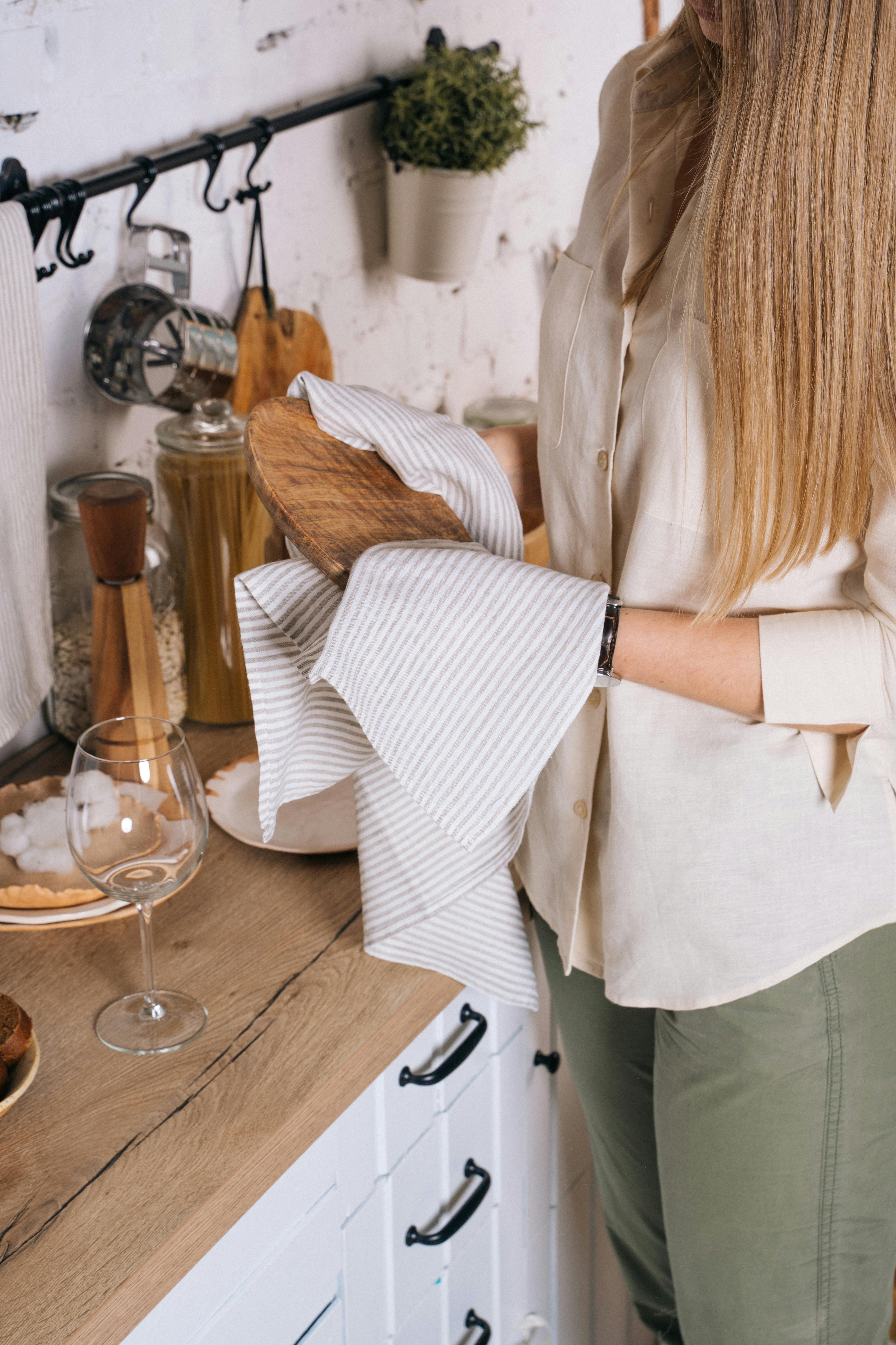 A Woman Standing Near the Kitchen Counter · Free Stock Photo