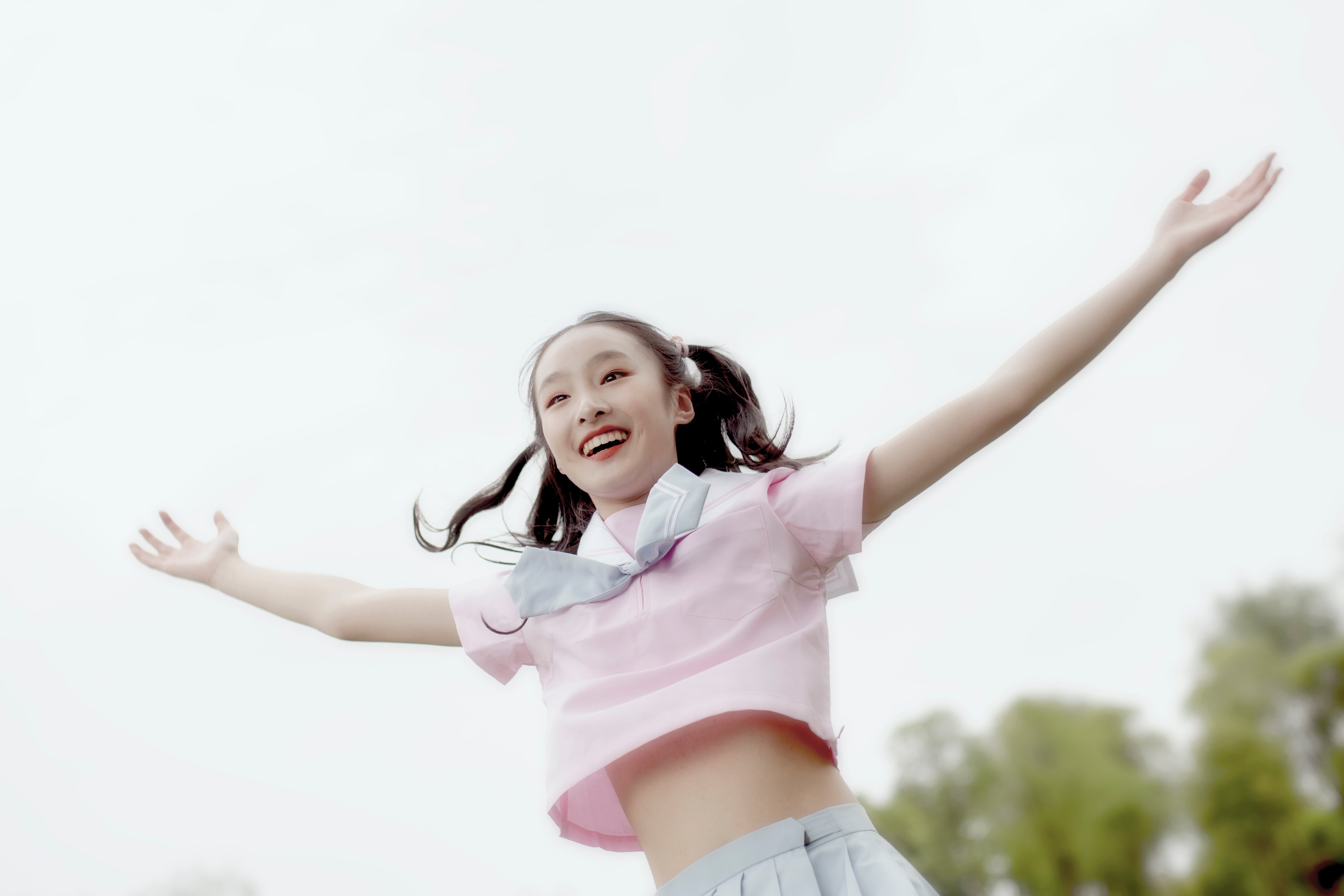 Girl Wearing Pink Button Up Shirt Smiling · Free Stock Photo