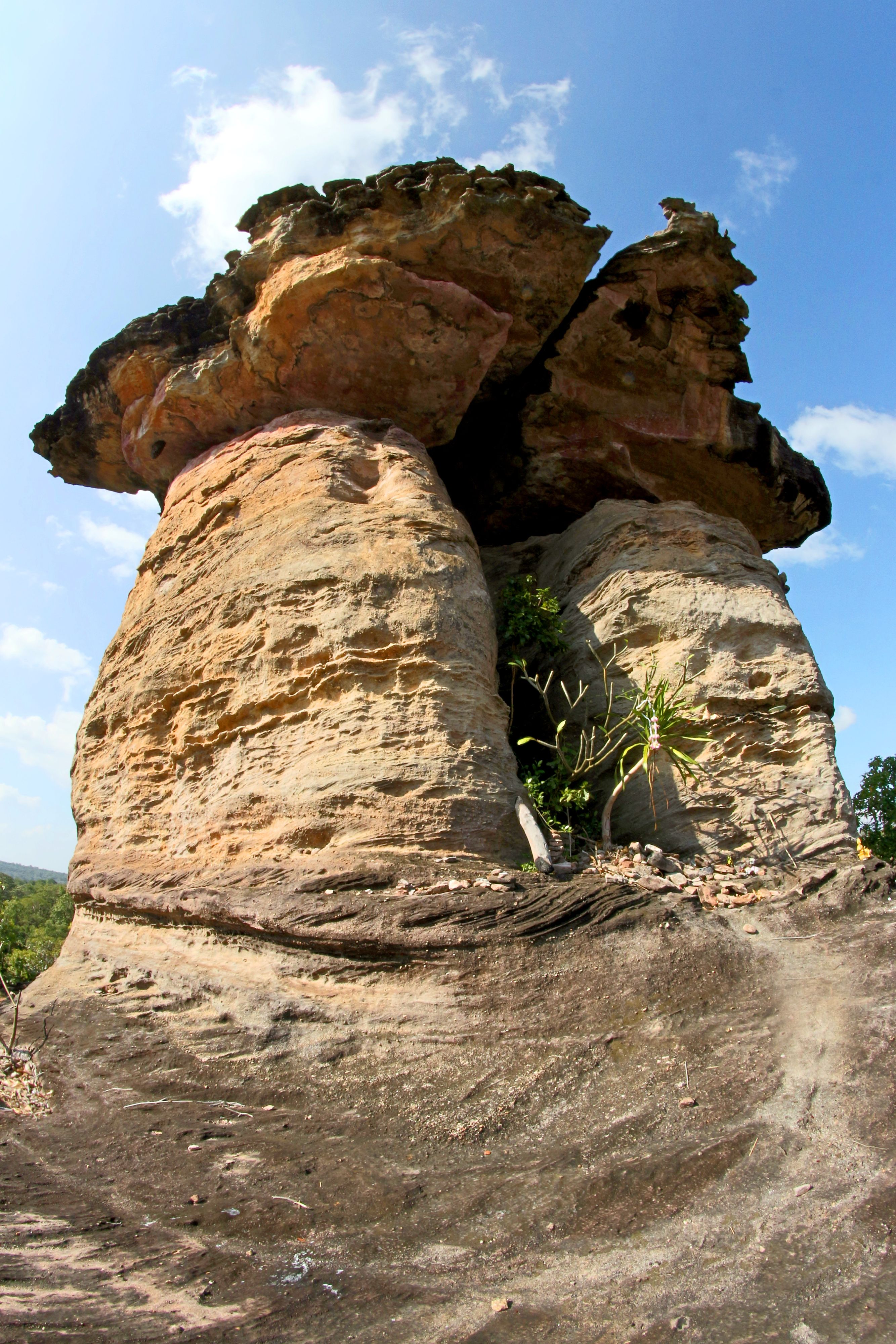 A person standing on top of a rock formation · Free Stock Photo