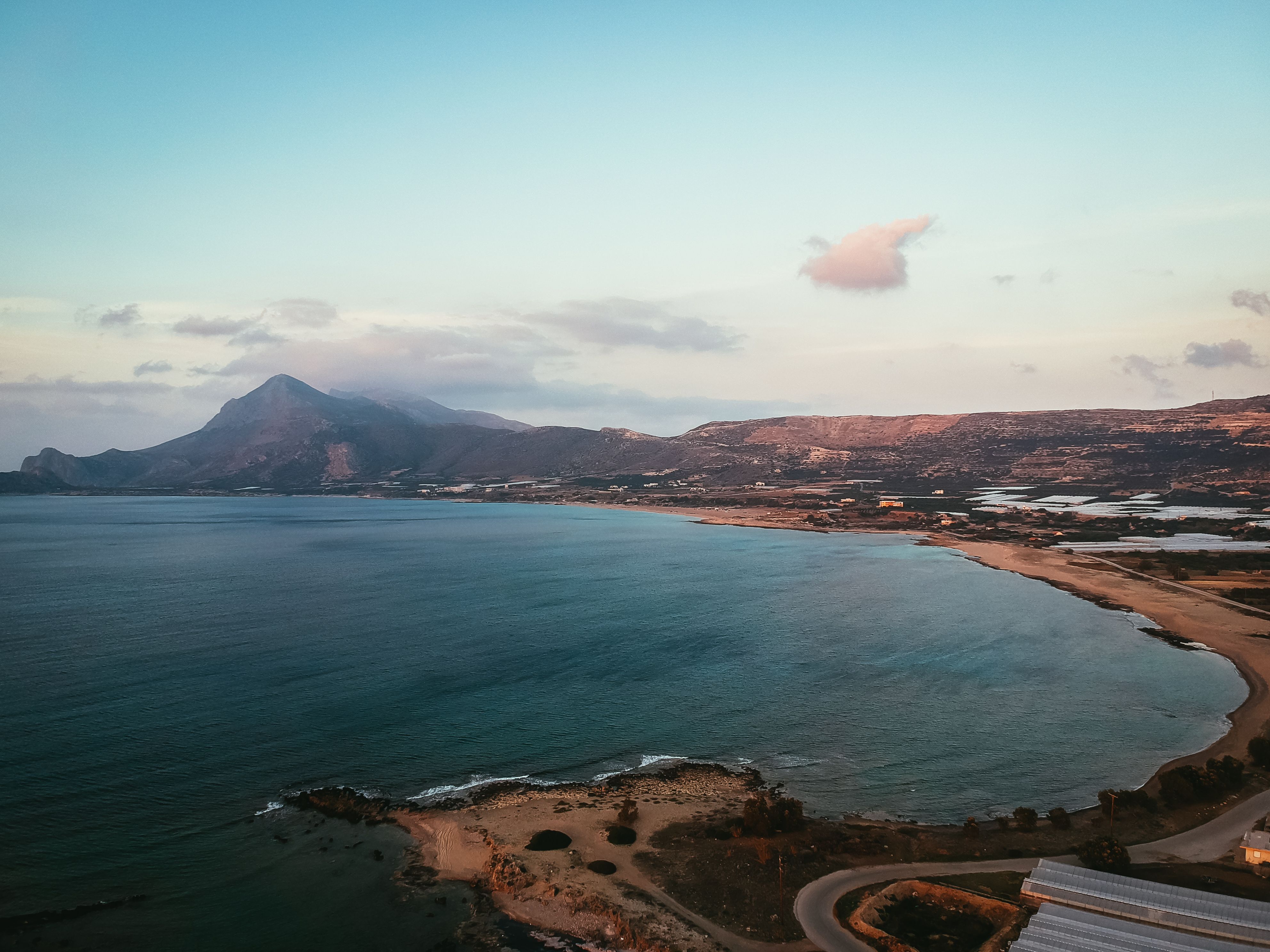 Scenic Seashore and Mountain Area with Blue Water · Free Stock Photo