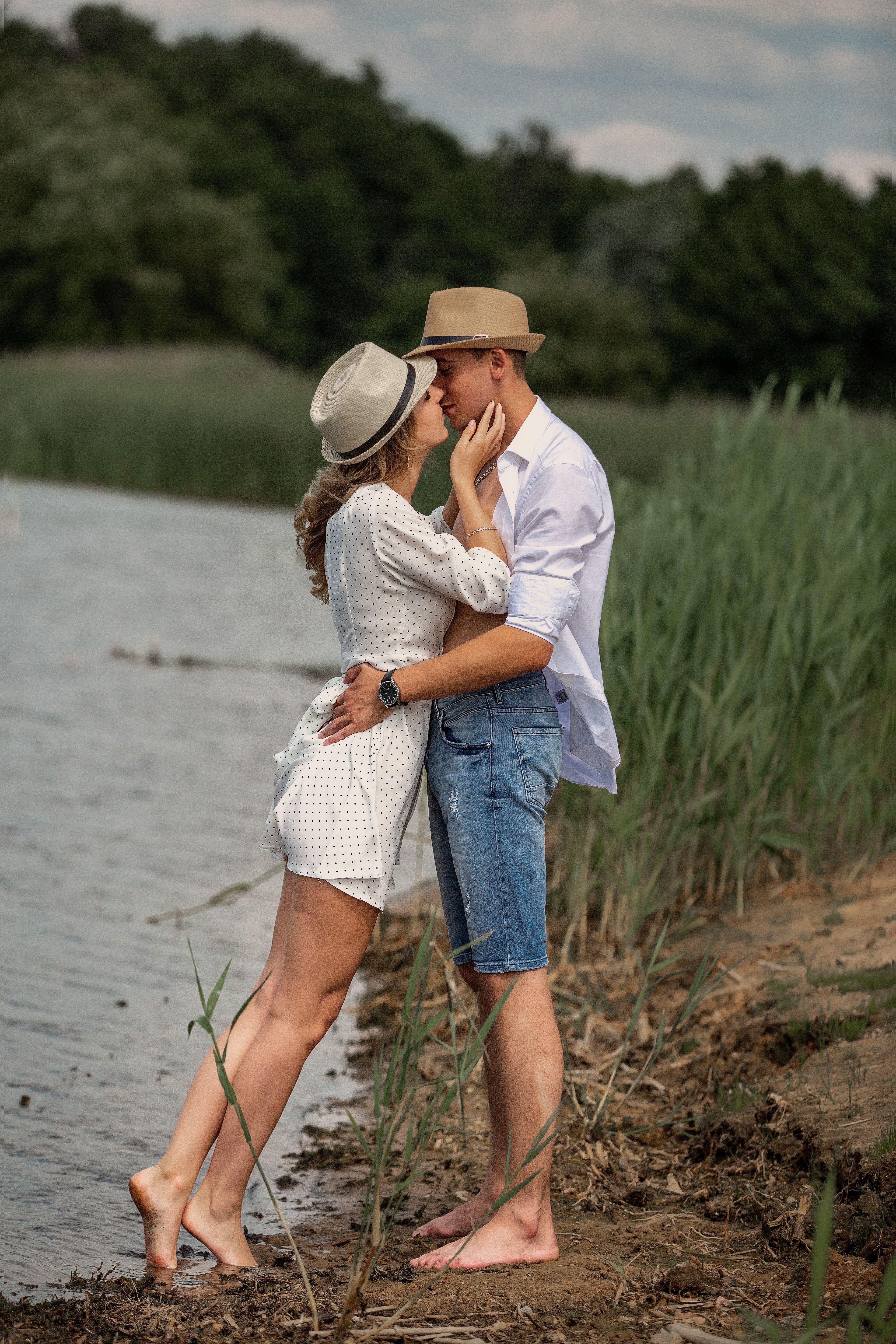A Couple Kissing by the Lake · Free Stock Photo